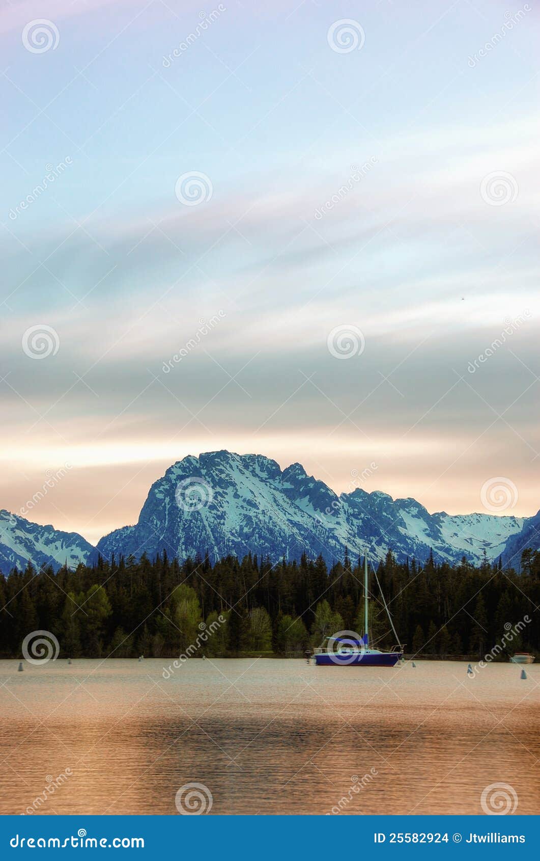 Sailboat in Colter Bay stock photo. Image of grand, sailing - 25582924