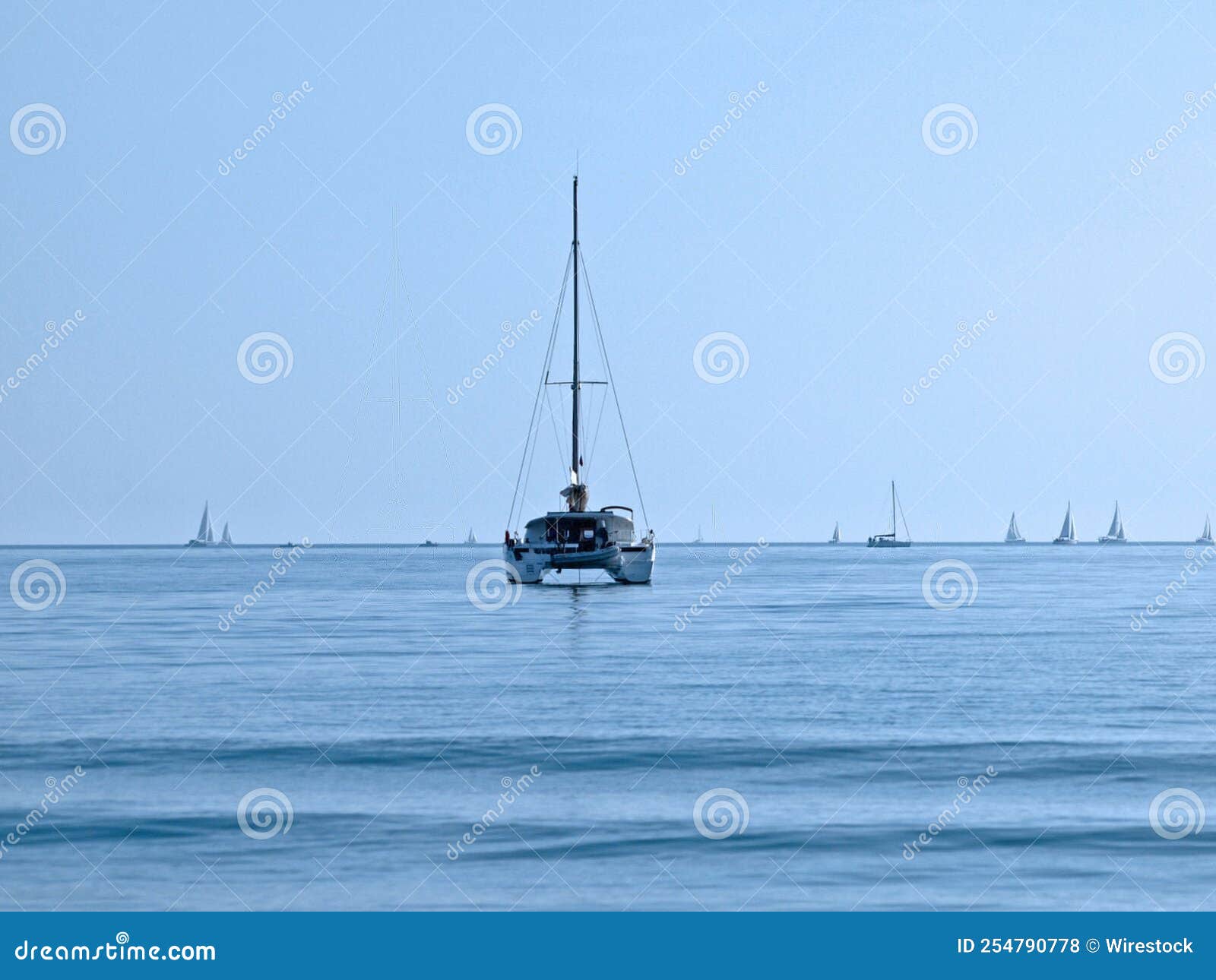 Sailboat Floating on Grand Traverse Bay Stock Photo - Image of blue ...