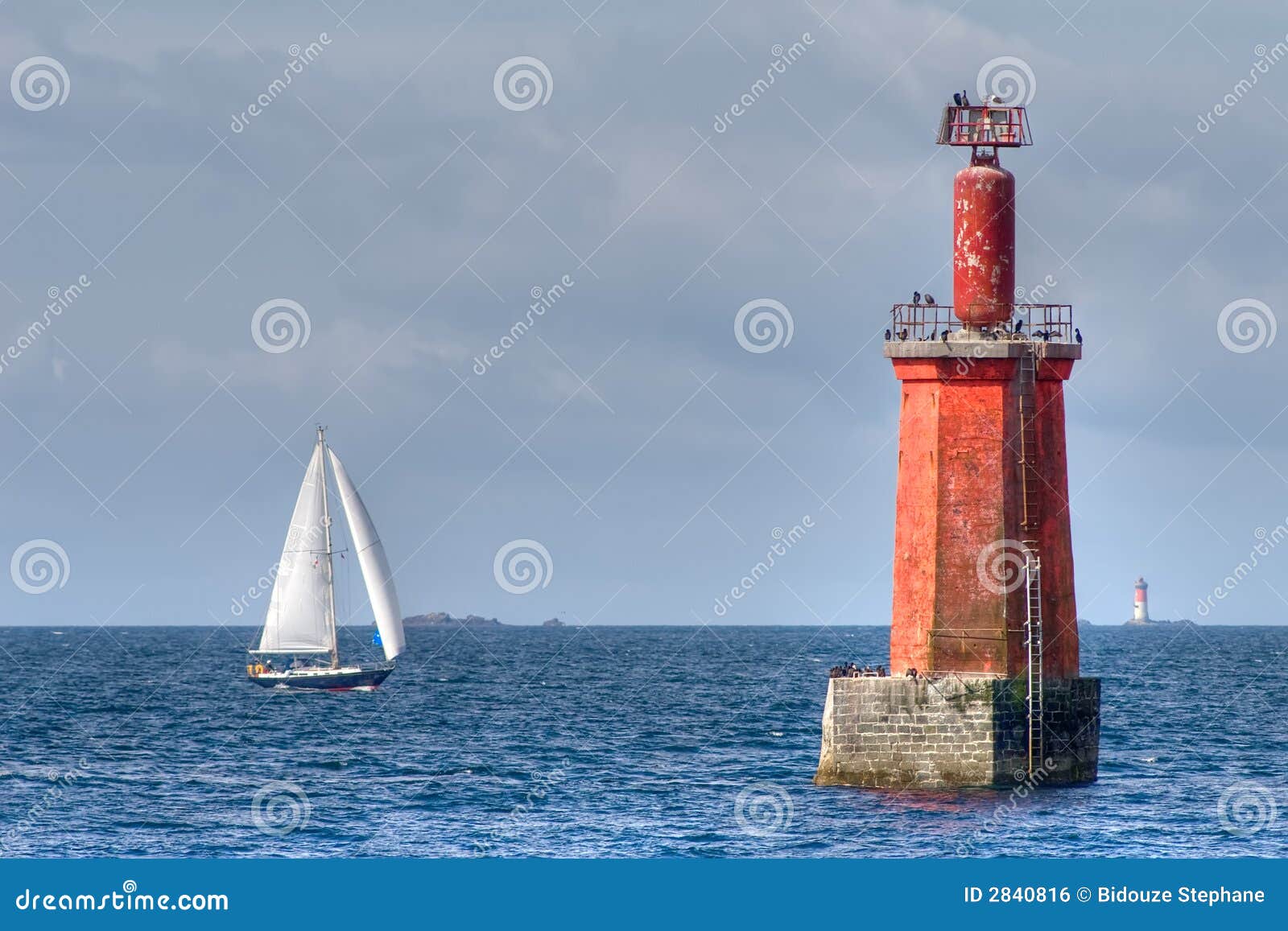 Sailboat and lighthouse stock photo. Image of cloudscape - 2840816