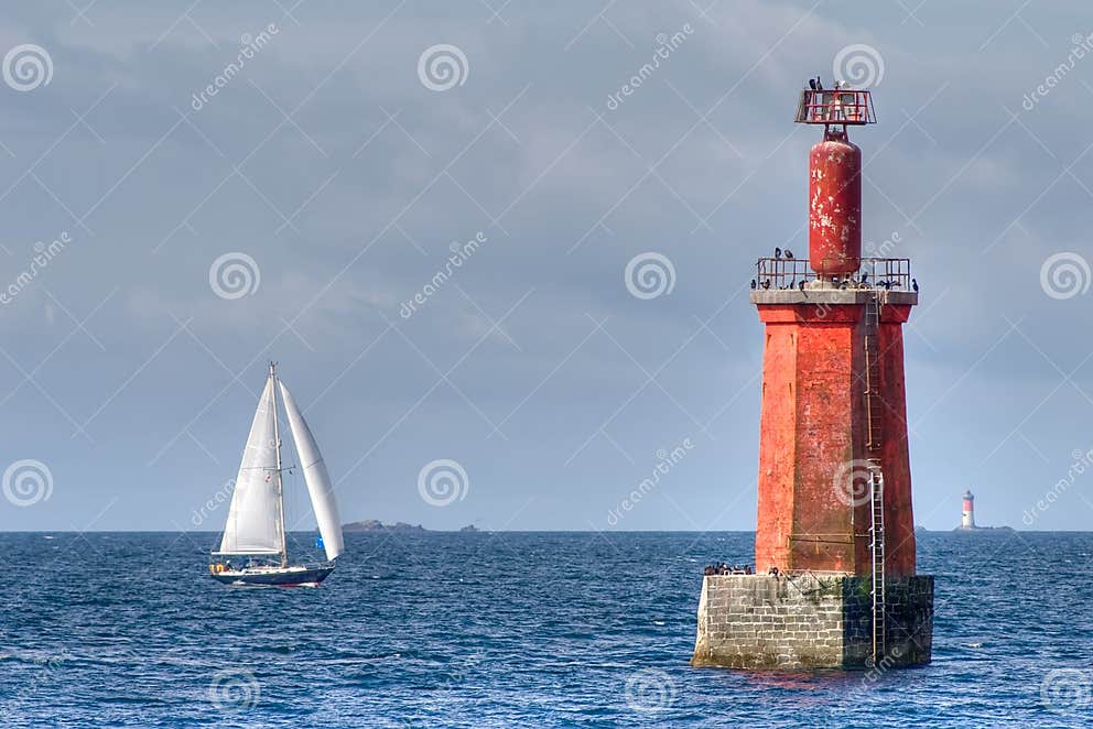 Sailboat and lighthouse stock photo. Image of cloudscape - 2840816