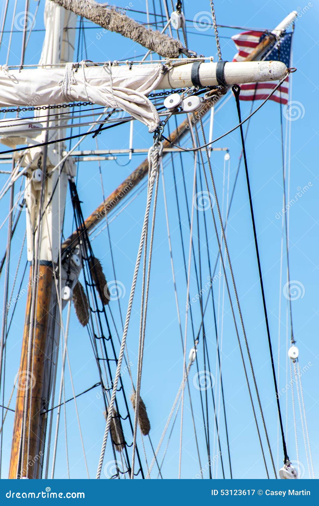 Sailboat Masts, Rigging and Rolled Up Sails Stock Image - Image of ...