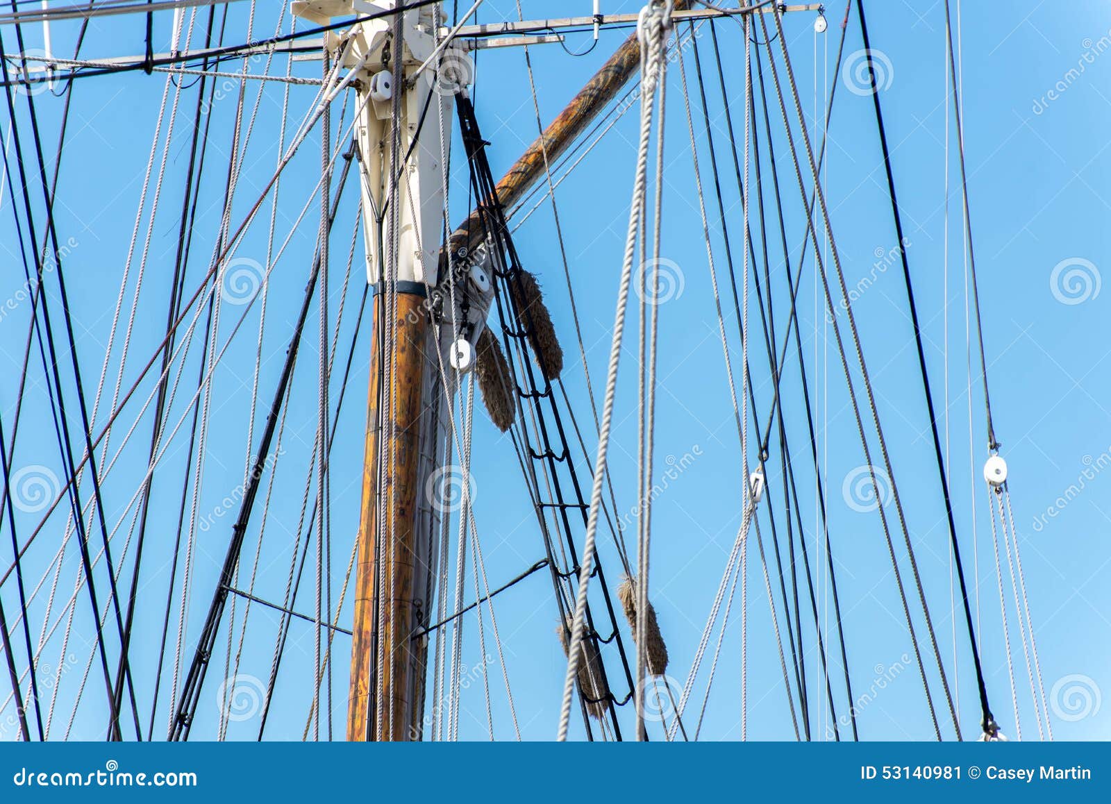 Sailboat Masts, Rigging and Rolled Up Sails Stock Image - Image of ...