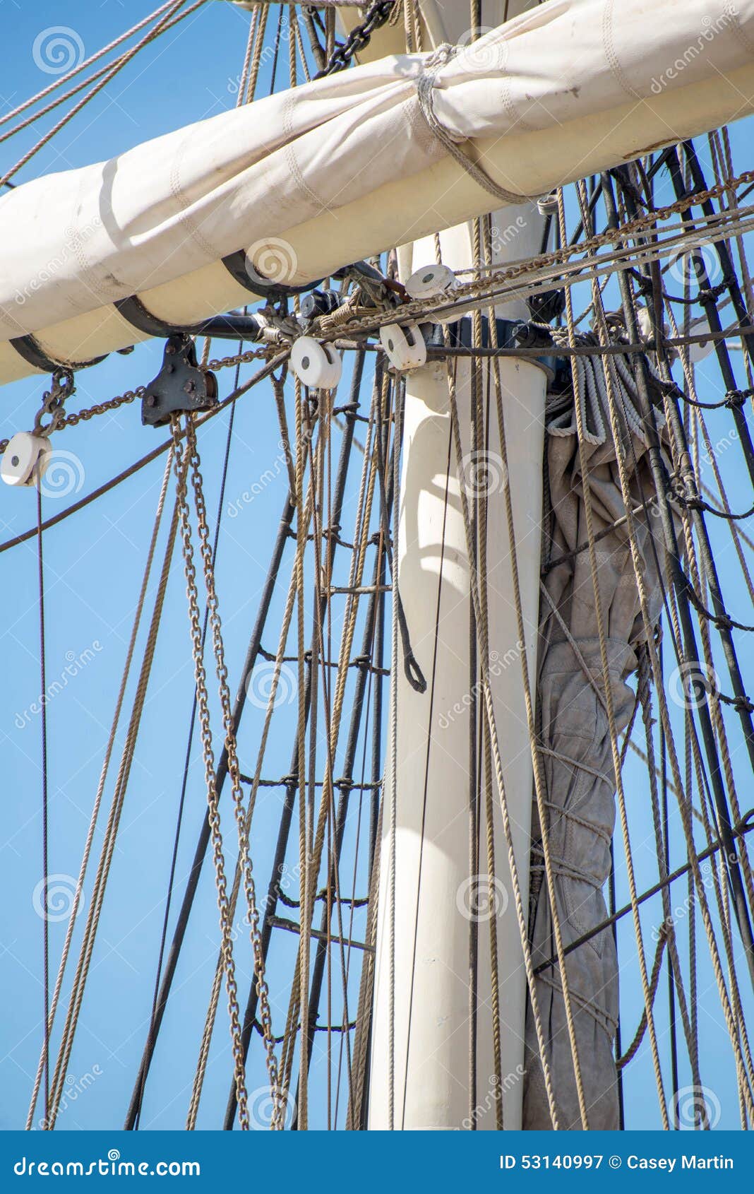 Sailboat Masts, Rigging and Rolled Up Sails Stock Image - Image of ...