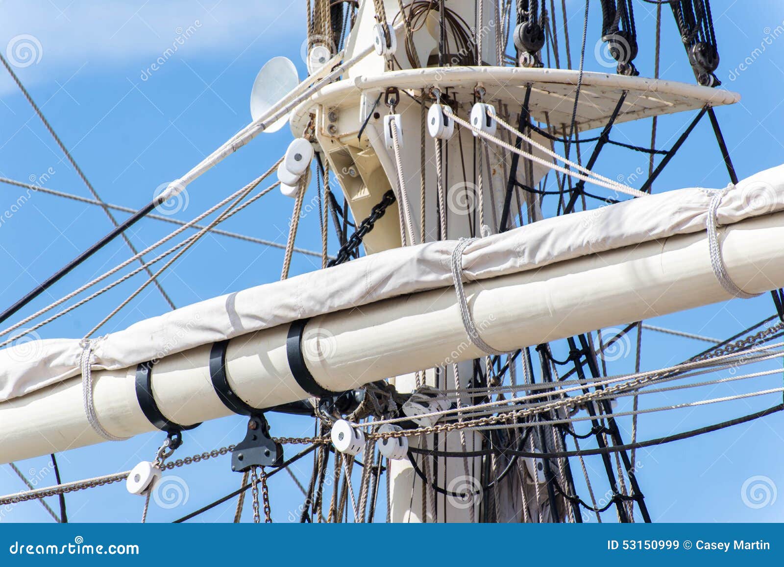 Sailboat Masts, Rigging and Rolled Up Sails Stock Image - Image of ...