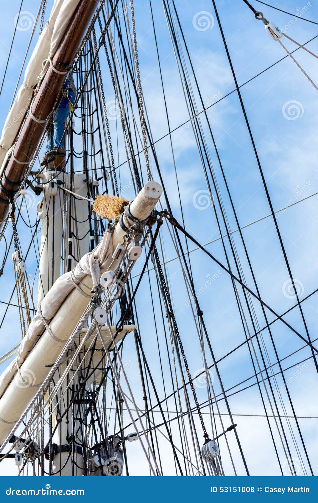 Sailboat Masts, Rigging and Rolled Up Sails Stock Photo - Image of ...