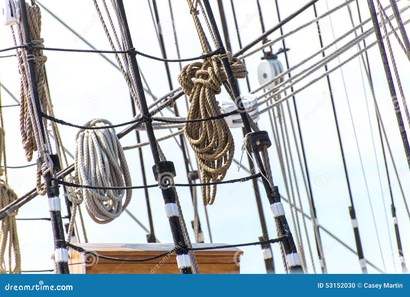 Sailboat Masts, Rigging and Rolled Up Sails Stock Photo - Image of ...