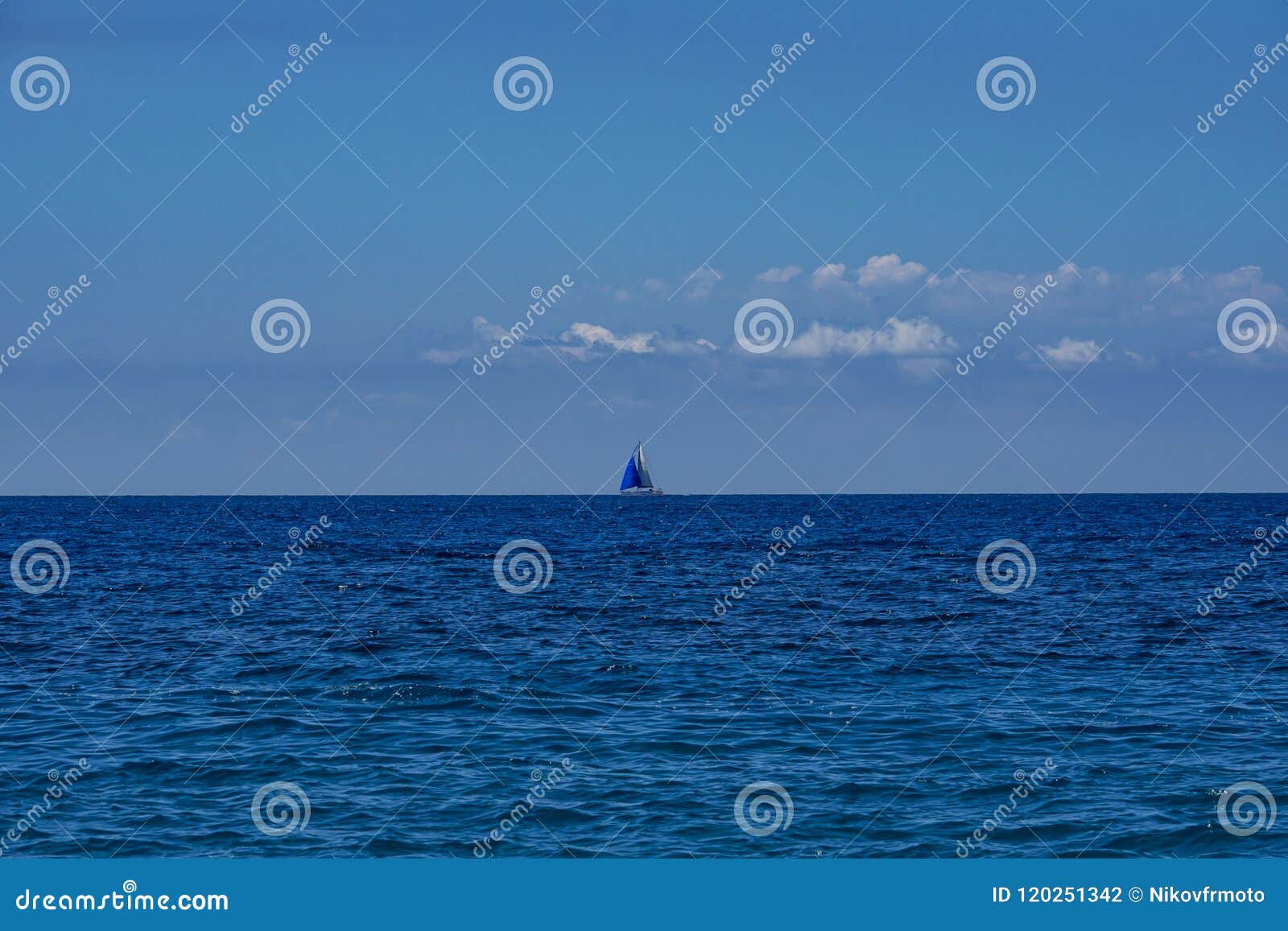 Sailboat in the Middle of the Sea Stock Photo - Image of horizon, blue ...