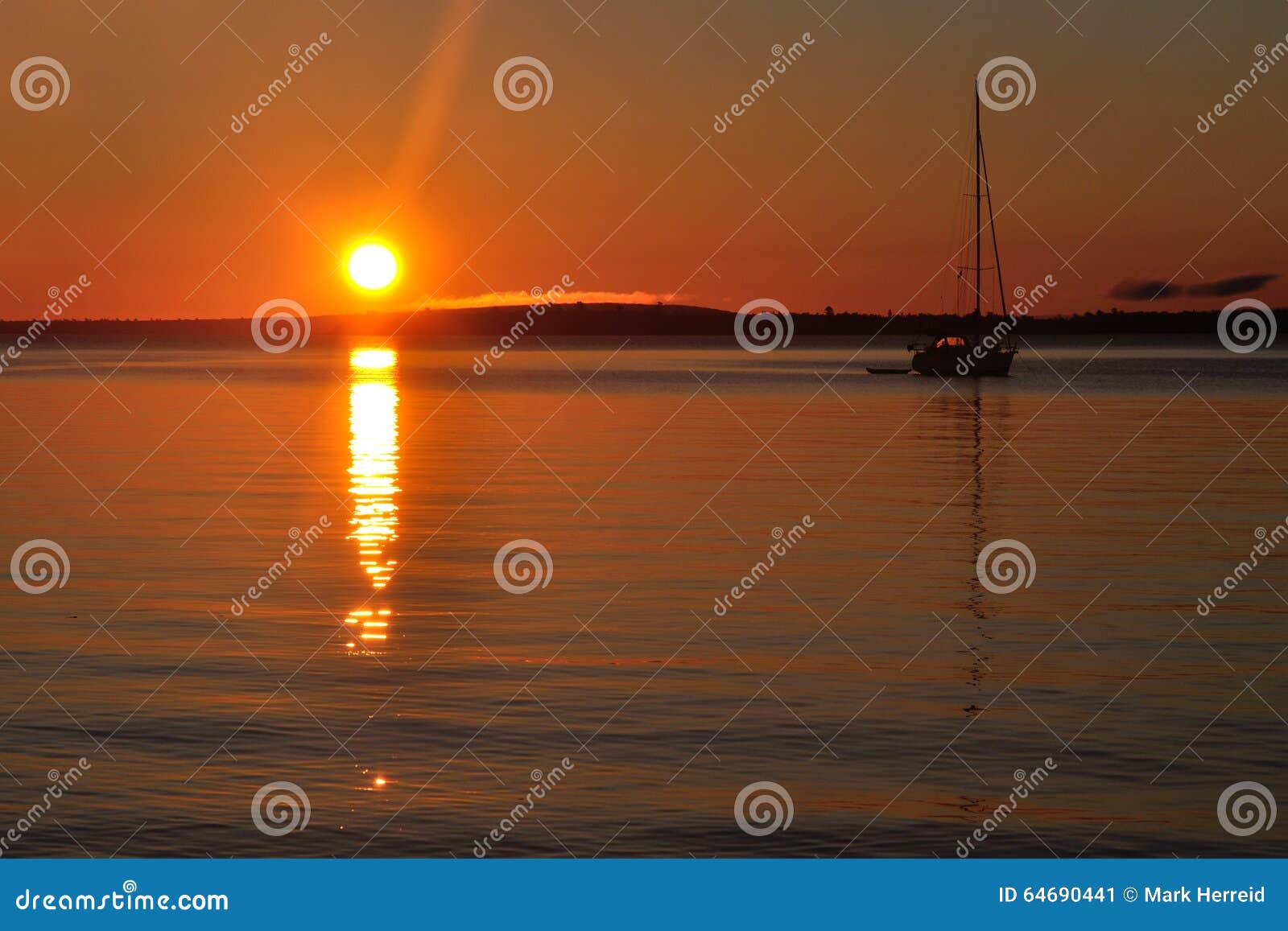Sailboat Moored at Sunrise stock image. Image of sunrise - 64690441