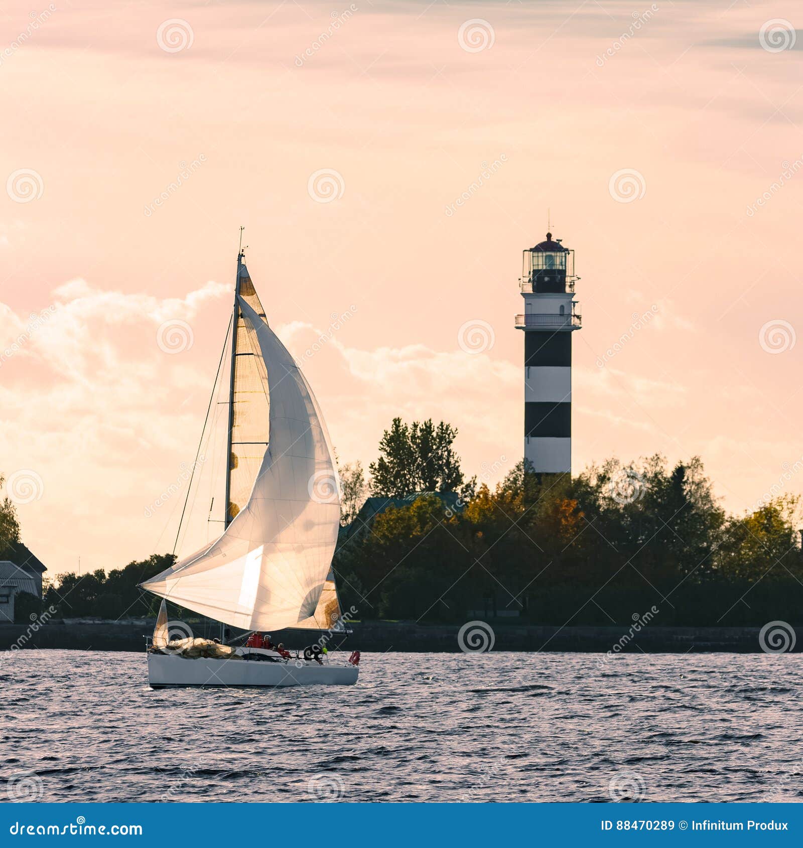 Sailboat Moving Past the Big Lighthouse Stock Image - Image of sport ...