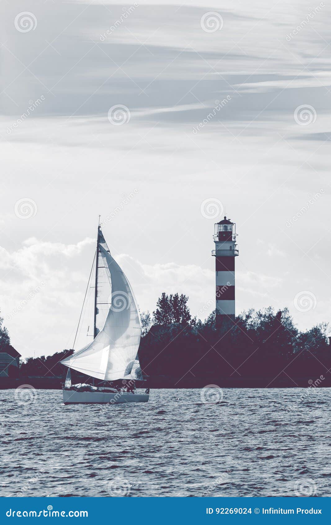 Sailboat Moving Past Lighthouse Stock Photo - Image of town, water ...
