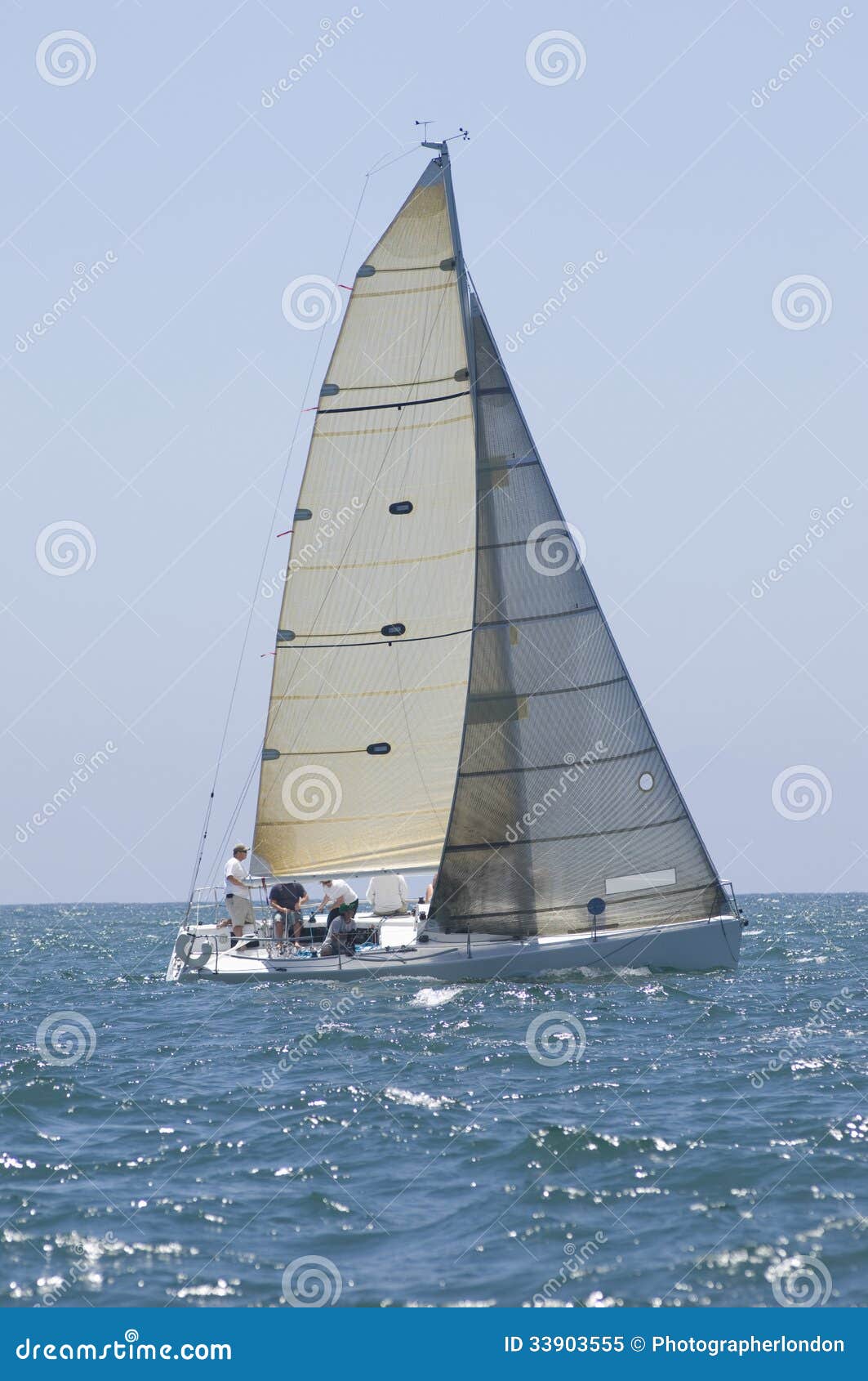 Sailboat Racing in the Blue Ocean Against Sky Stock Image - Image of ...
