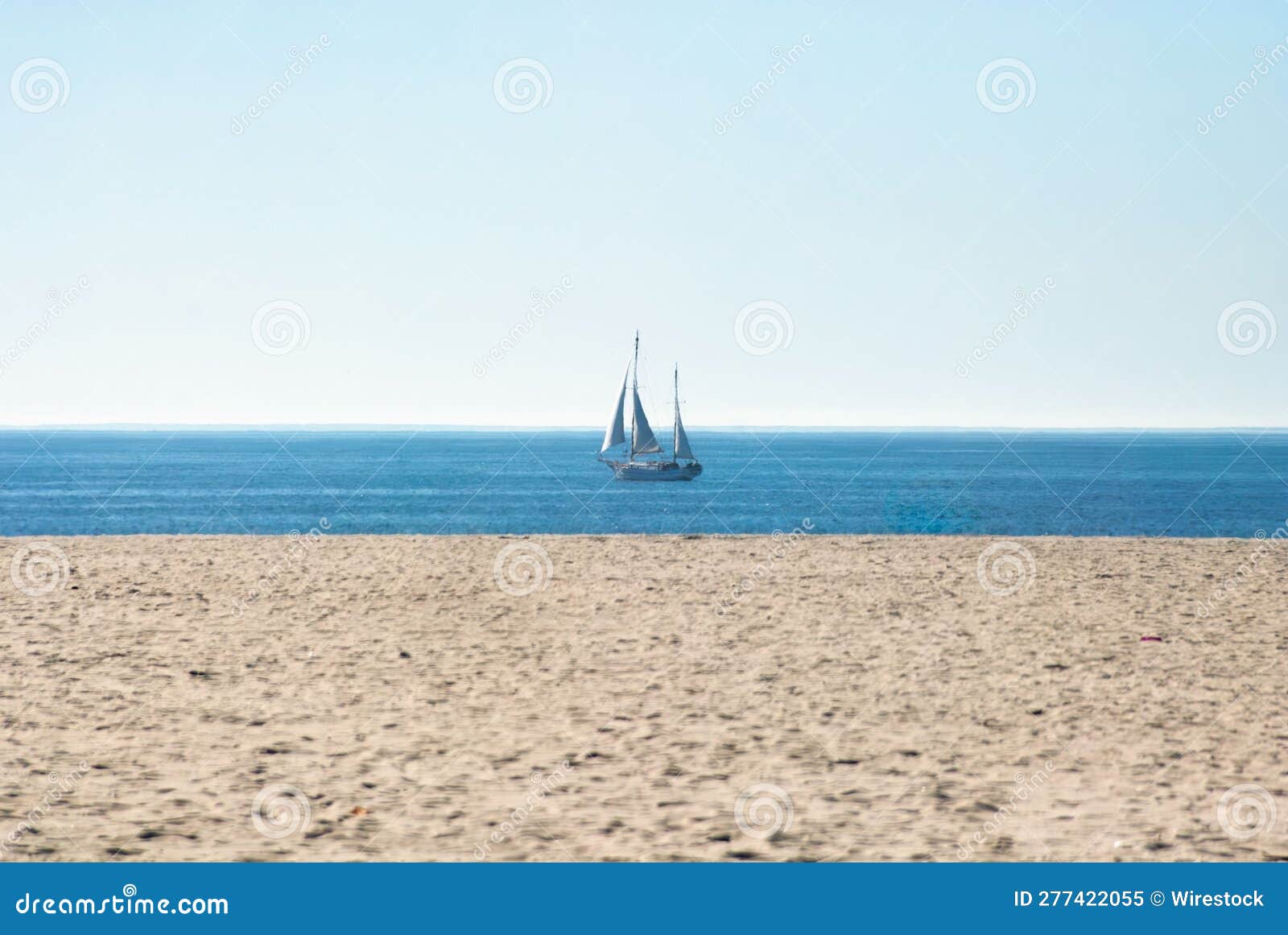 Sailboat Sailing on a Tranquil Body of Water. Stock Image - Image of ...