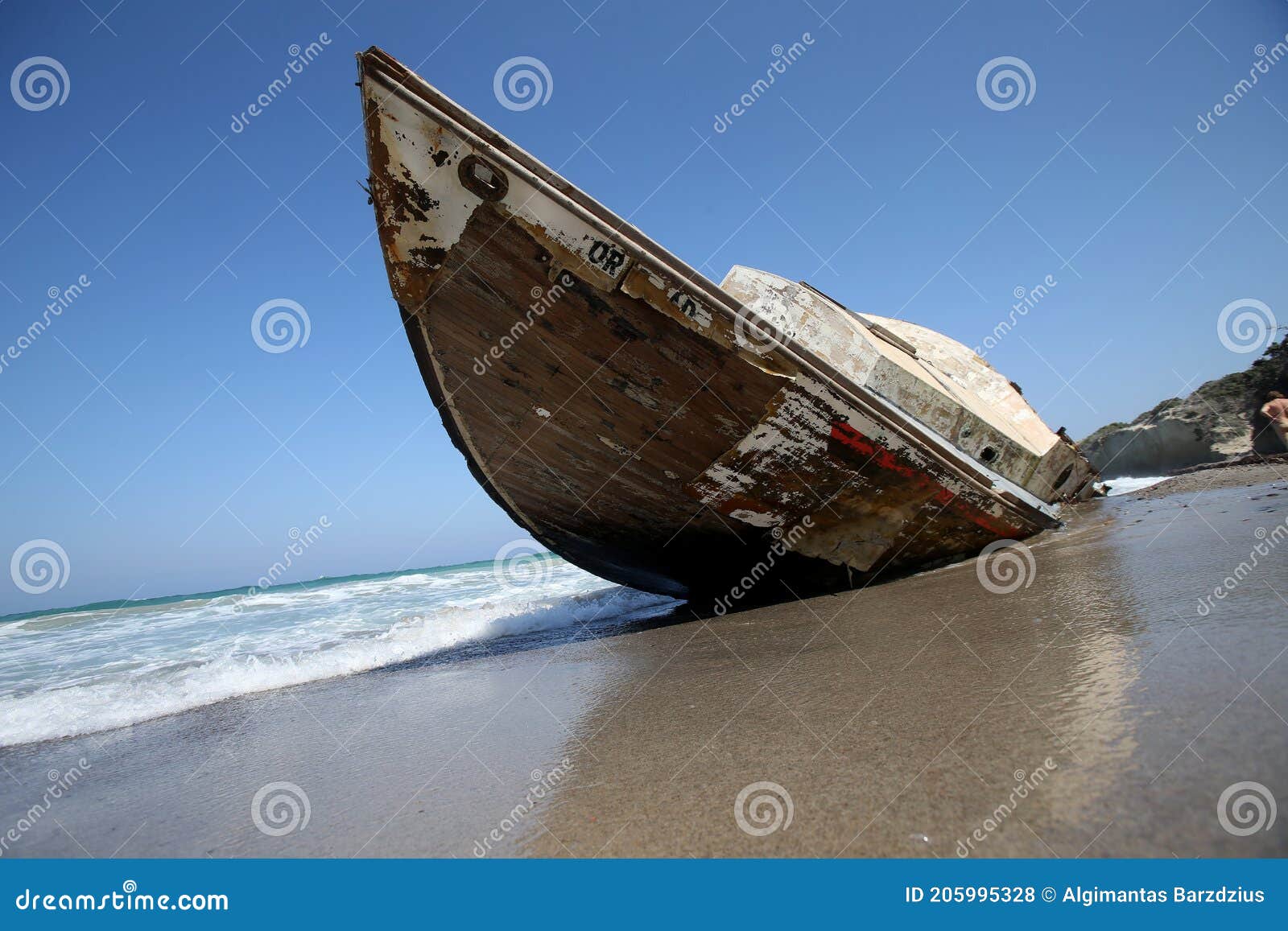 Sailboat Stranded on the Beach after a Storm. Greece, Kos Stock Photo ...