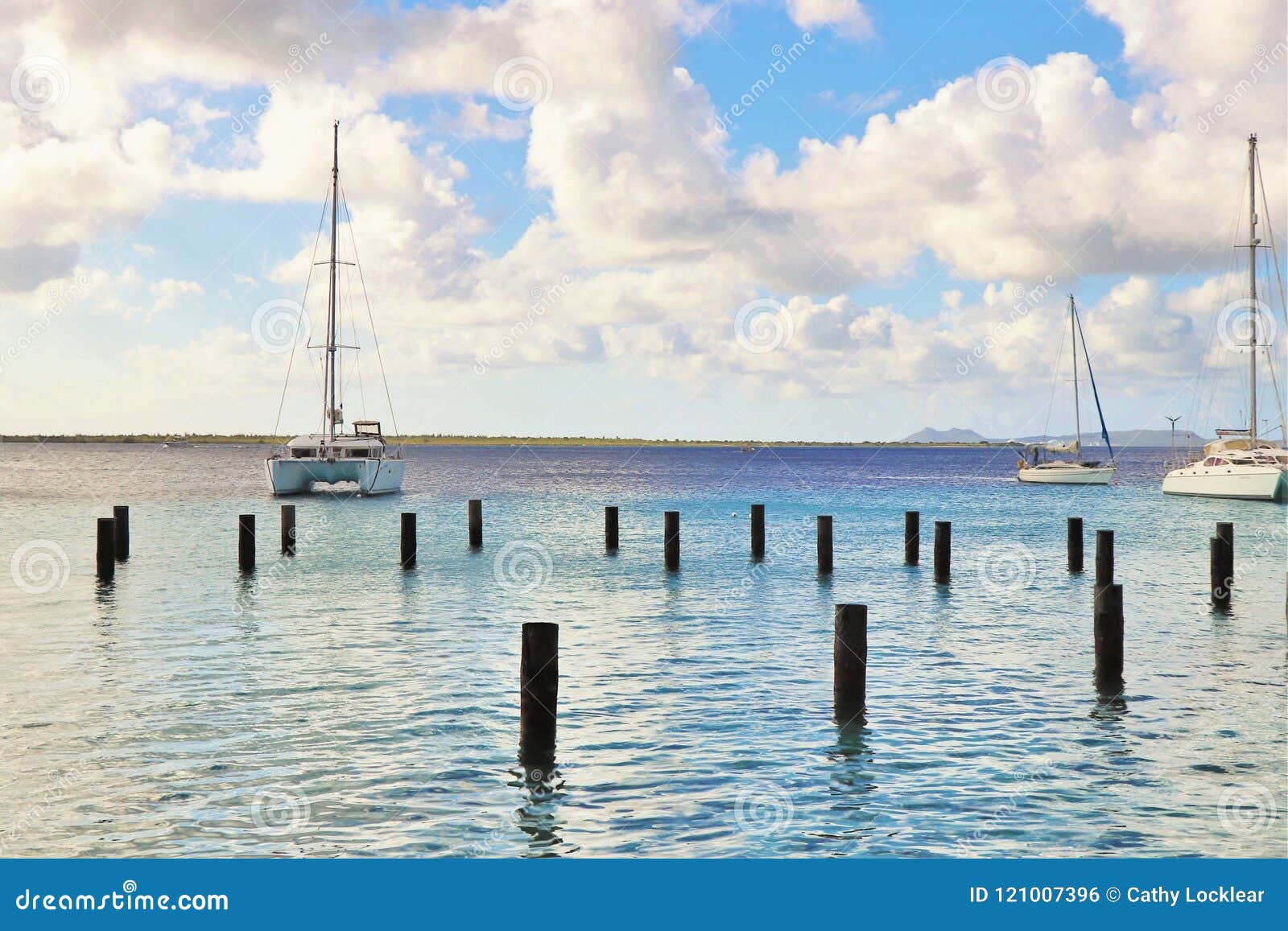 Sailboats on the Ocean with Pilings Stock Photo - Image of vessel, boat ...