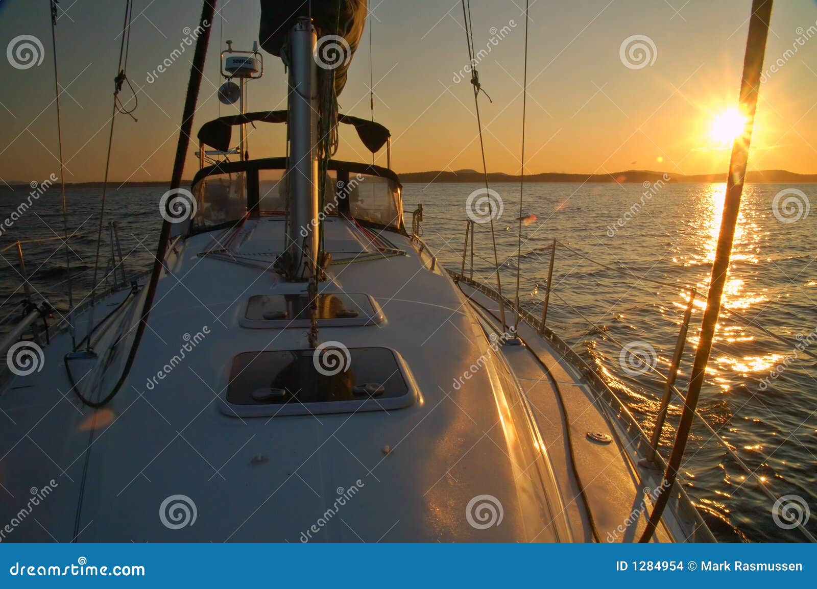 Sailing Away from the Sunset Stock Photo - Image of boat, sloop: 1284954