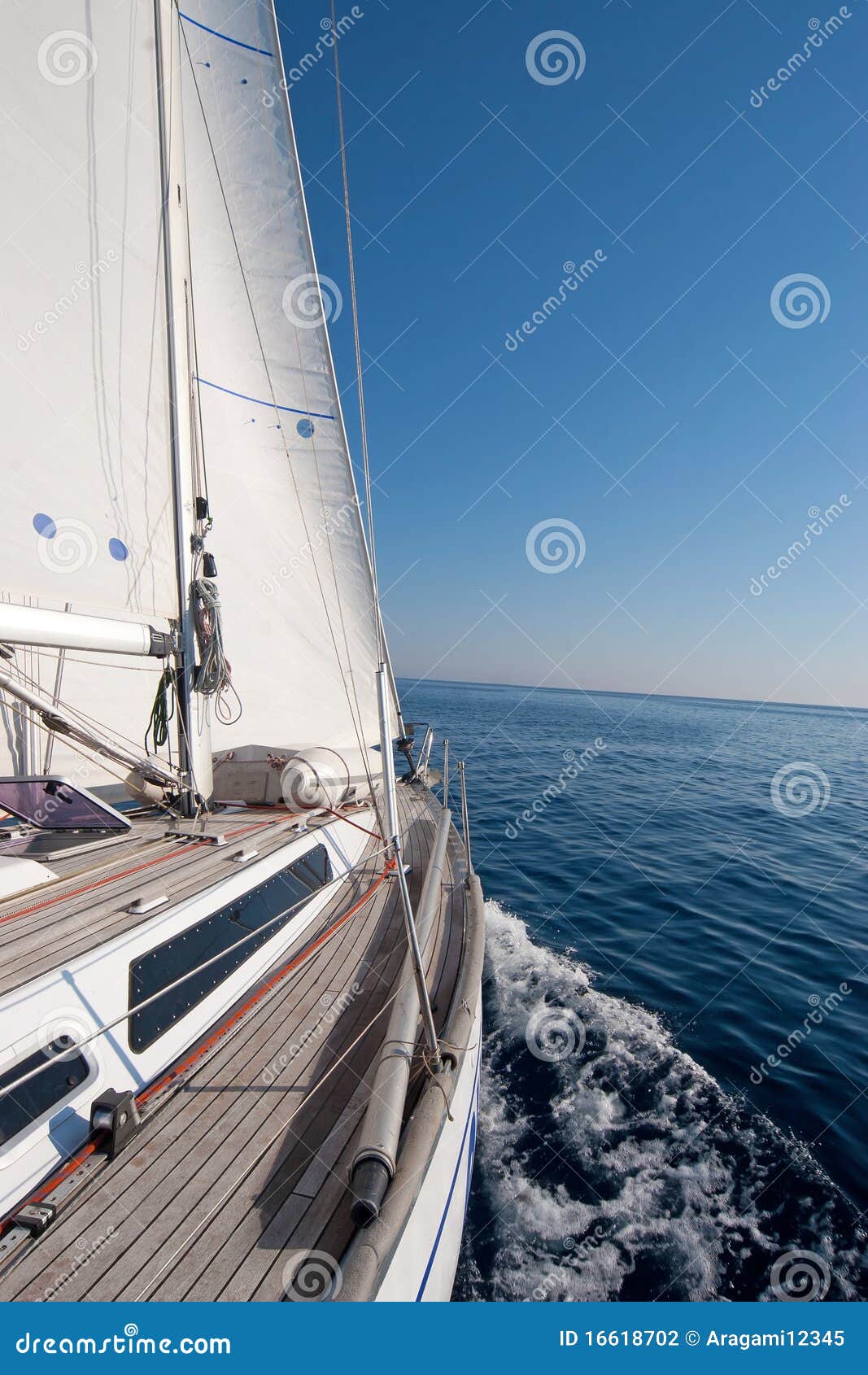 Sailing boat in the sea stock photo. Image of orange - 16618702
