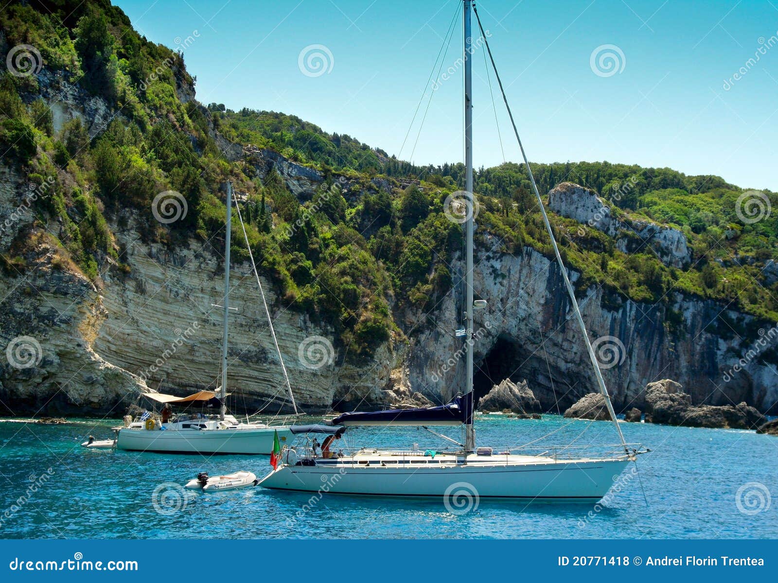 Sailing Boats Anchored Near Cliffs Stock Photo - Image of calm, ocean ...