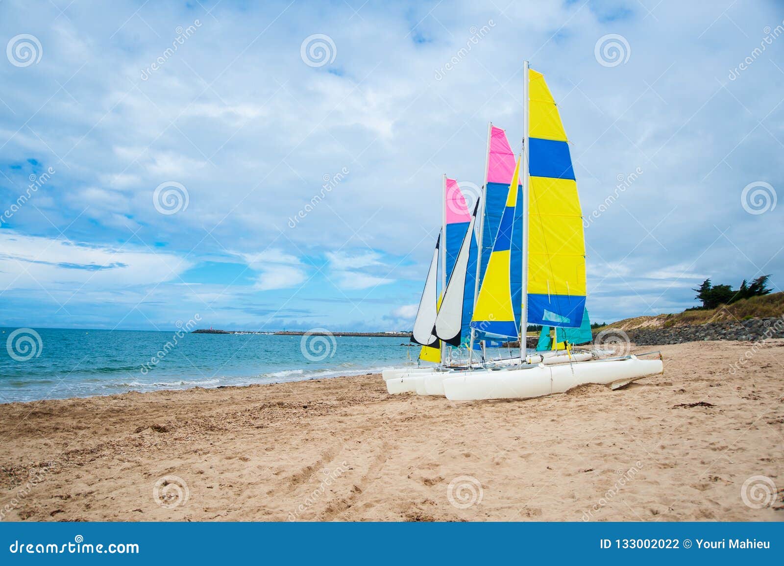 Sailing boats on the beach stock photo. Image of sailing - 133002022
