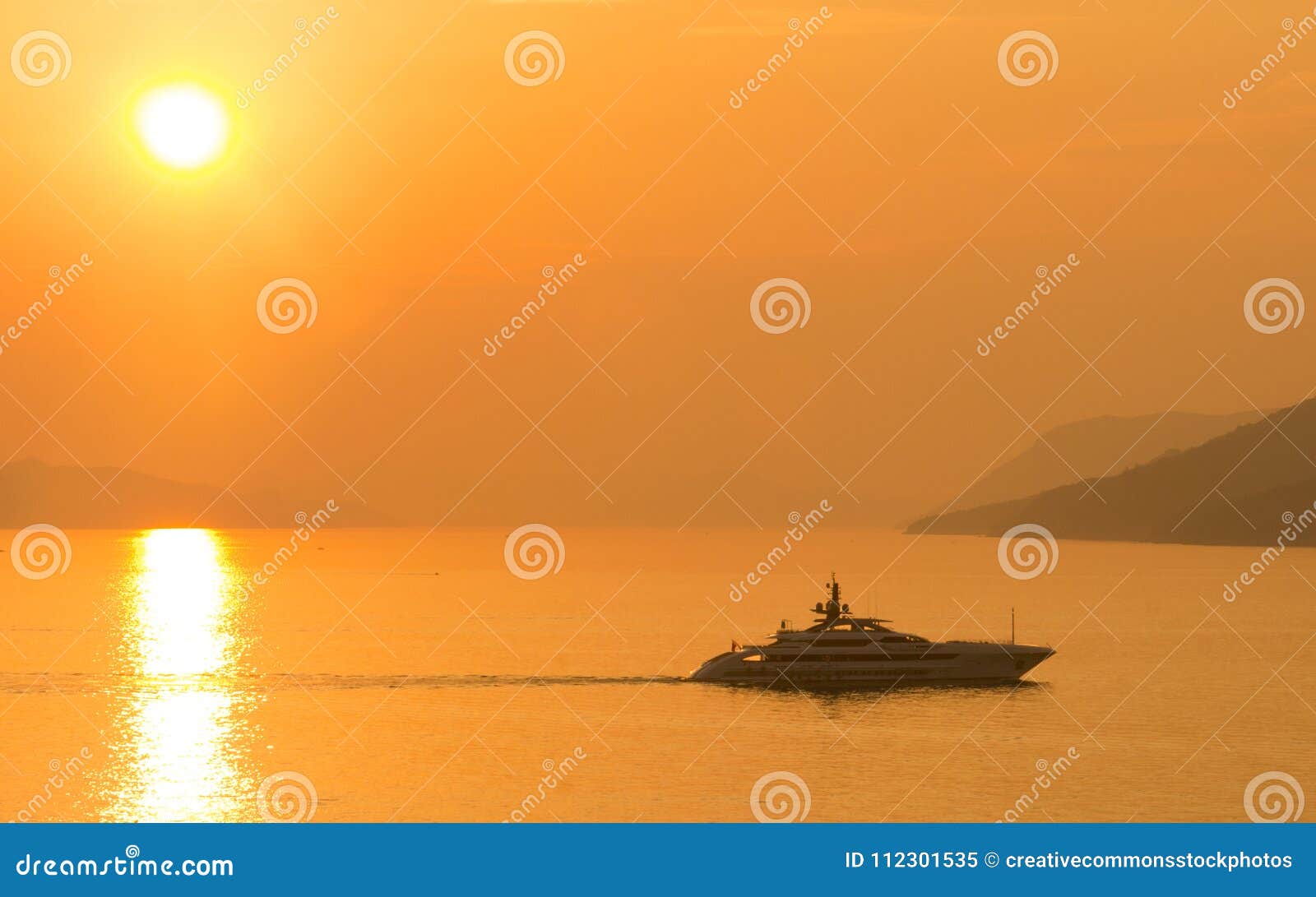 Sailing Cruise Ship During Yellow Sunset Picture. Image: 112301535