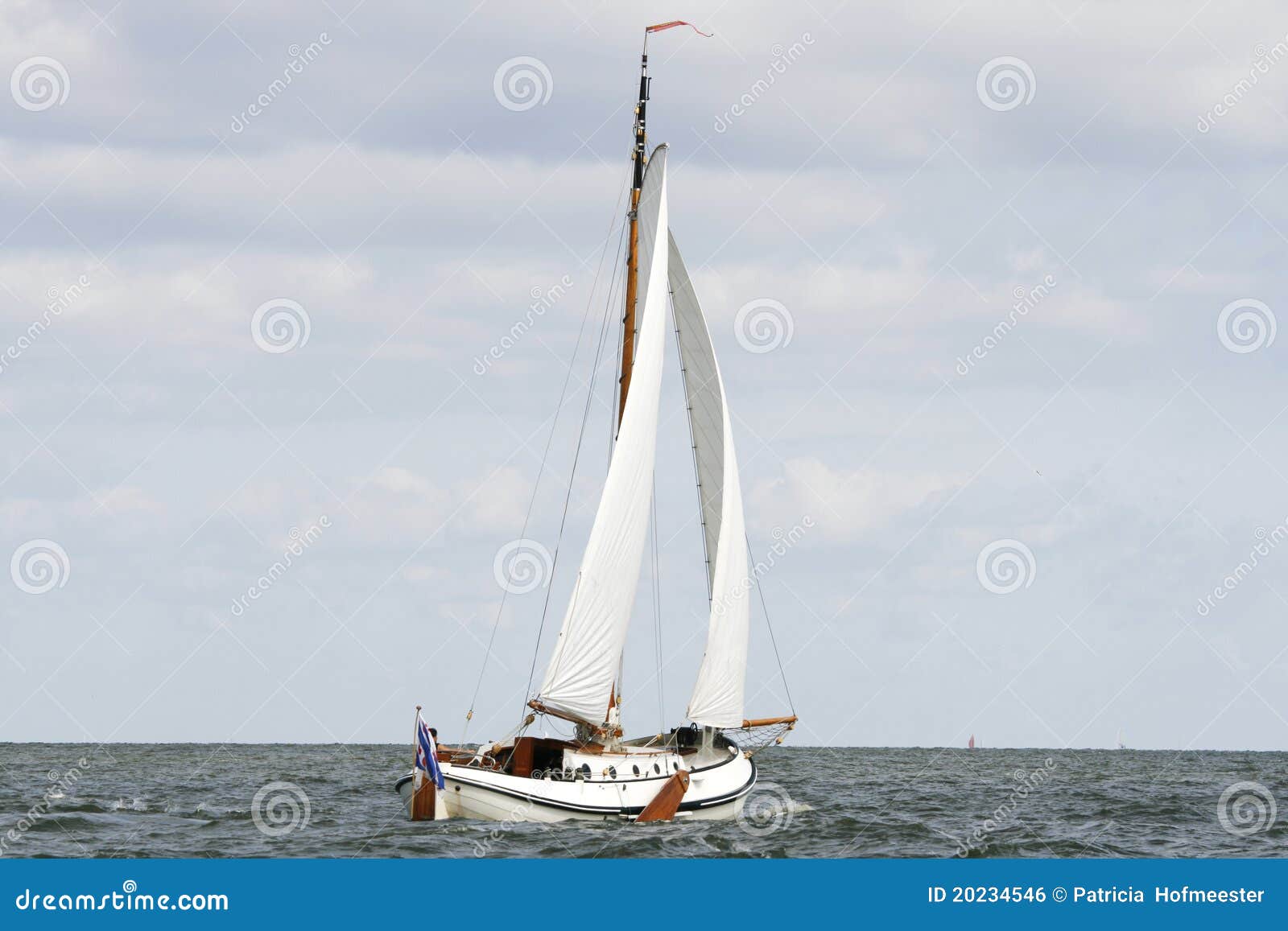 Sailing a flatbottom boat stock photo. Image of calm - 20234546