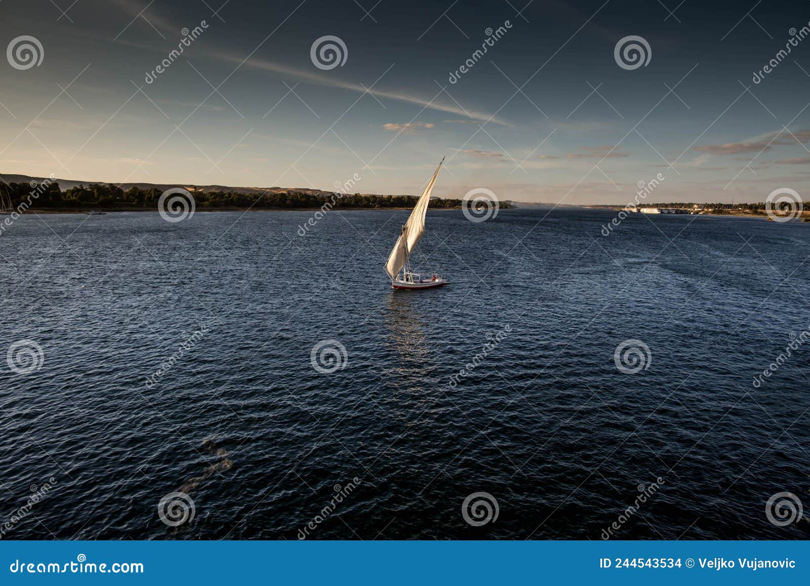 The Old Man Was Sailing On The River With An Oar In His Hand. Editorial ...