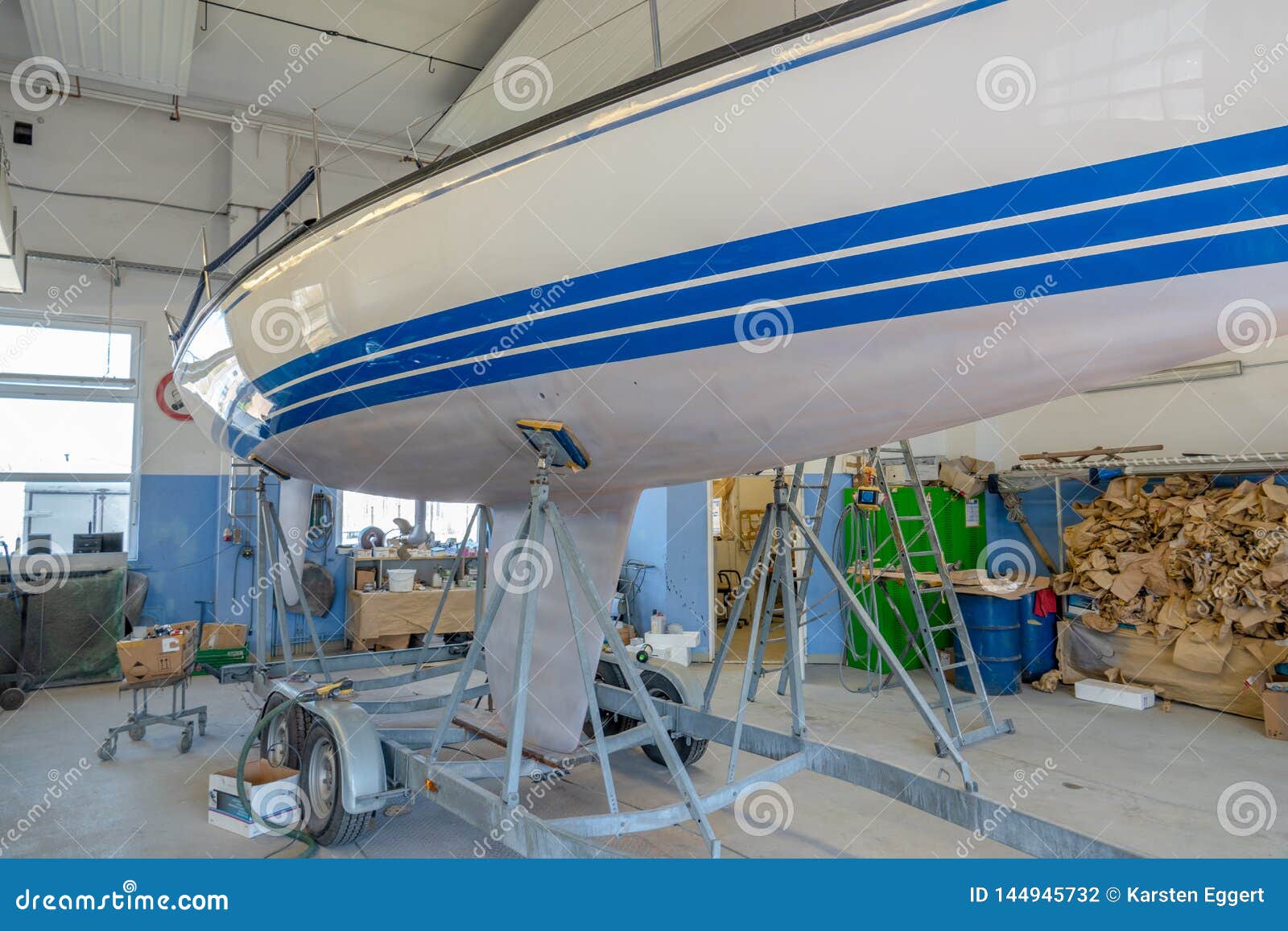 Sailing Ship Stands in a Paint Shop To Be Repainted Stock Photo - Image ...