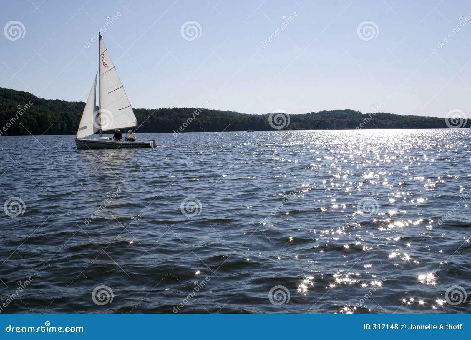 Sailing on sparkling lake stock photo. Image of activity - 312148