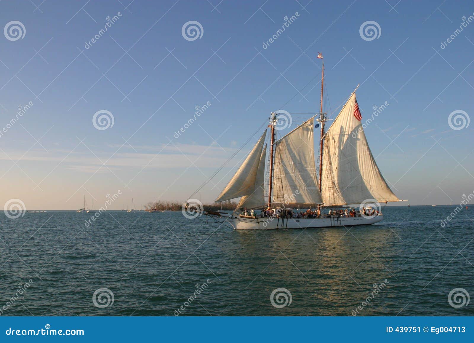 Sailing into the Sun stock image. Image of rigging, boating - 439751