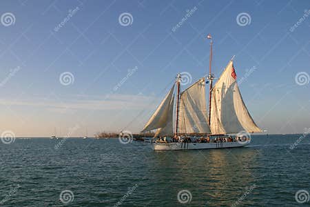 Sailing into the Sun stock image. Image of rigging, boating - 439751