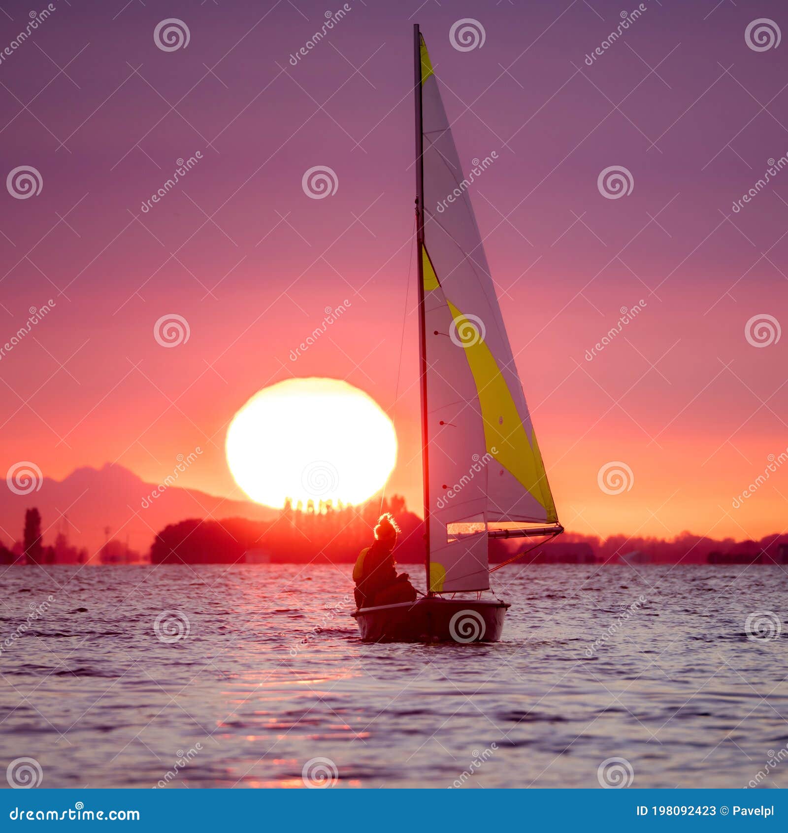 Sailing at Sunset stock image. Image of sailboat, adventure - 198092423