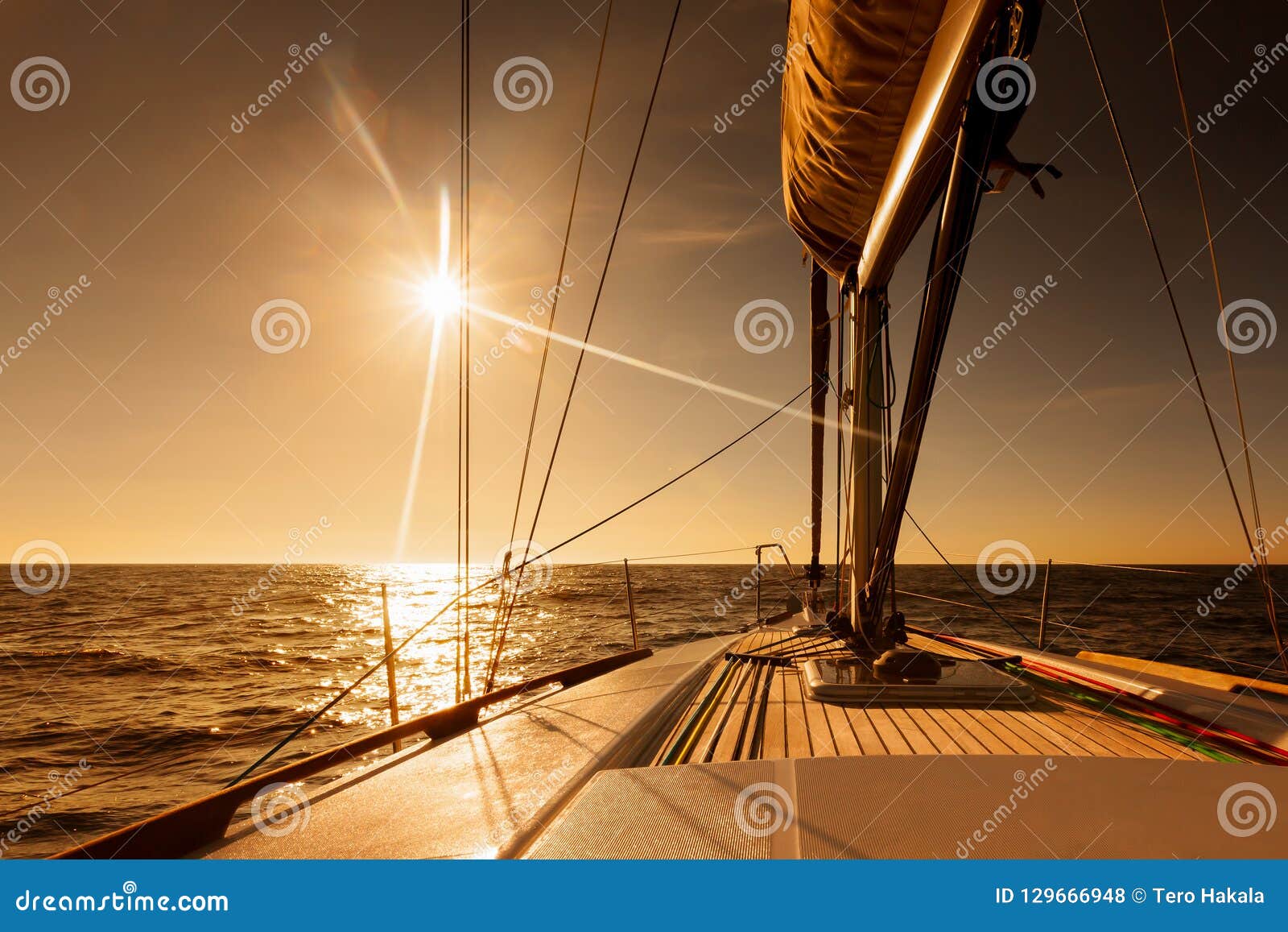 Sailing Towards Sunset at Open Sea Stock Photo - Image of golden ...