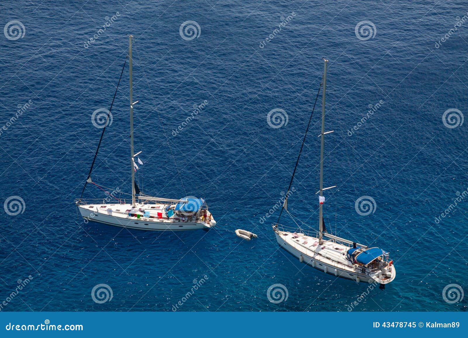 Sailing yachts at open sea stock image. Image of sails - 43478745