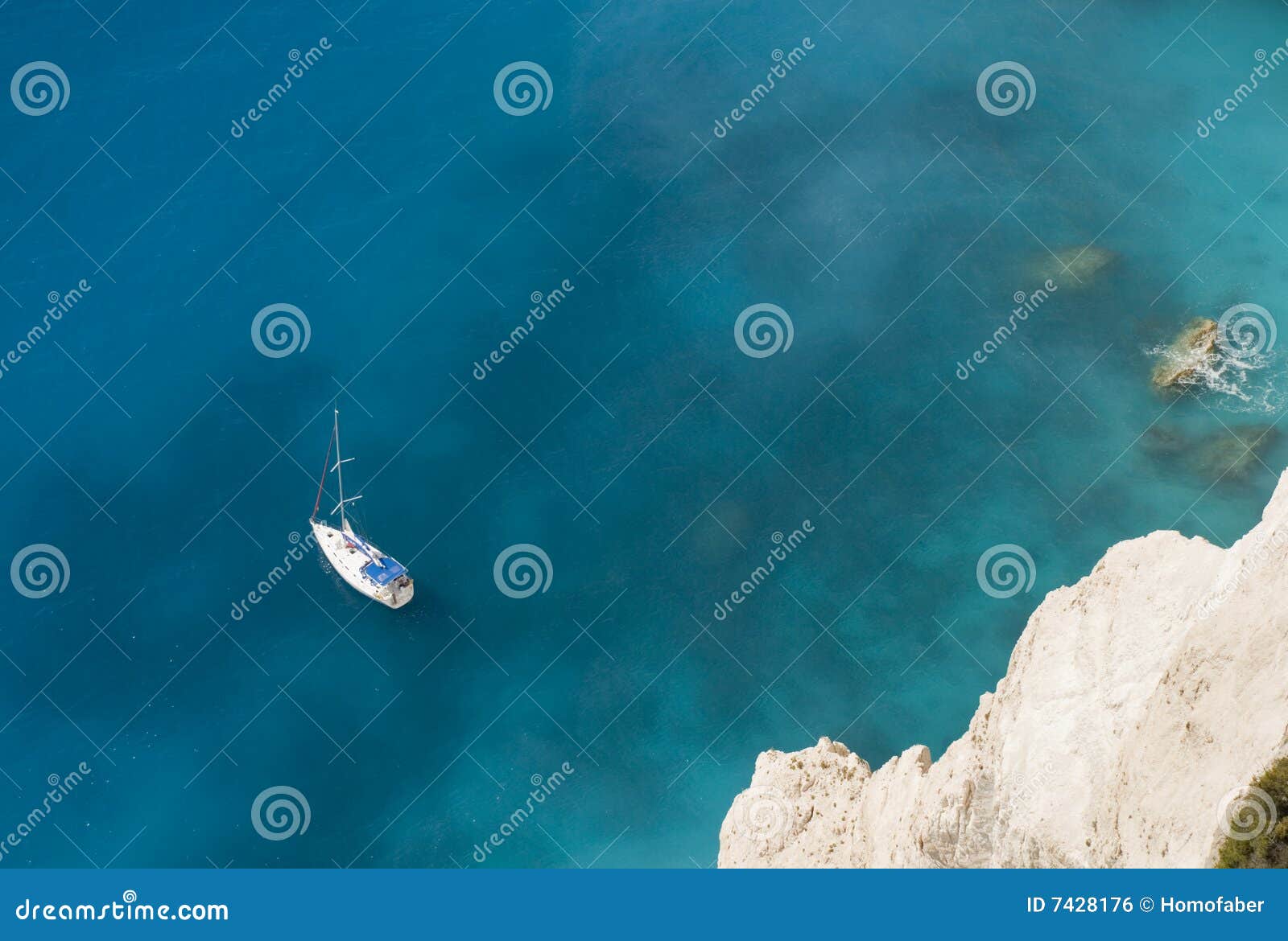 Sailor boat on blue waters stock photo. Image of sailor - 7428176