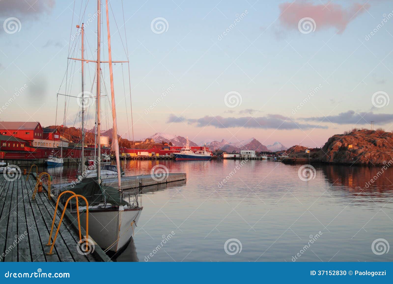 Sailor and Docks of Stamsund Stock Photo - Image of harbour, cloud ...