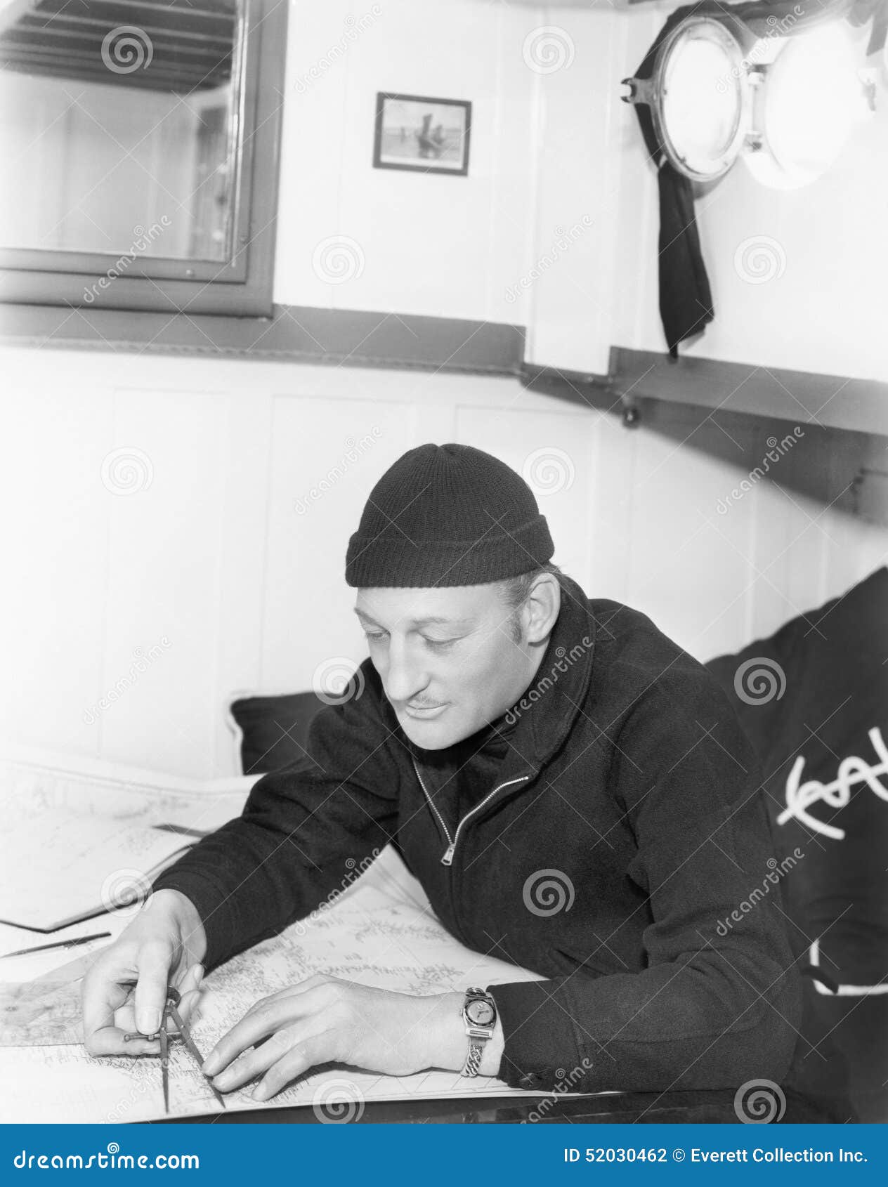 Sailor Looking Over A Map With A Compass Royalty-Free Stock Image ...