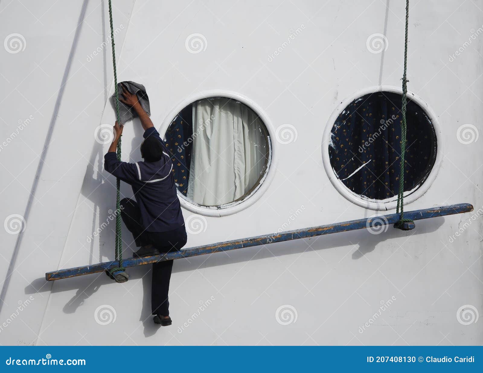 Sailor Man Cleaning Windows on Cruise Ship on Nile River. Egypt Stock ...