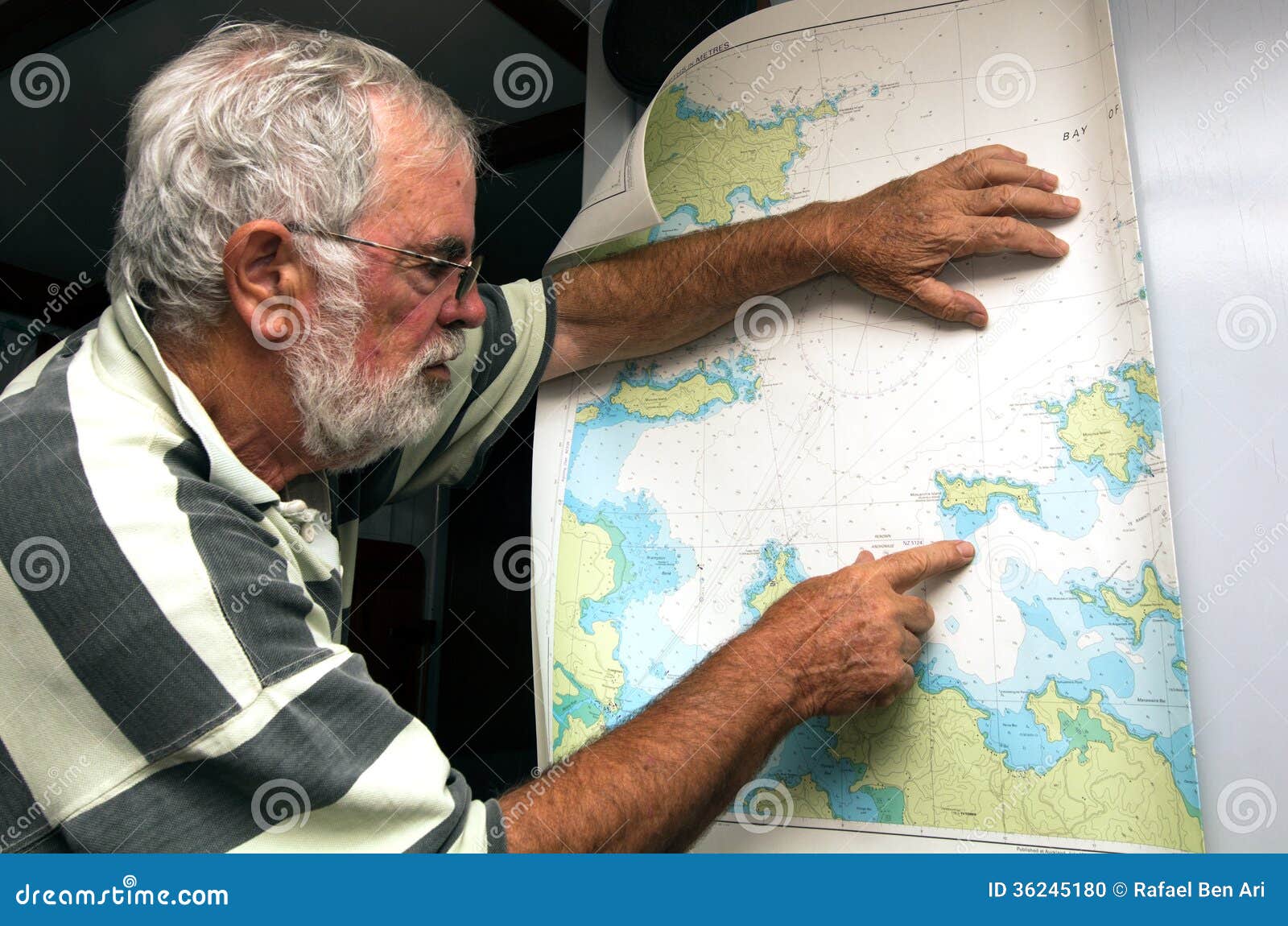 Sailor Reads A Sea Map Stock Photography | CartoonDealer.com #36245180
