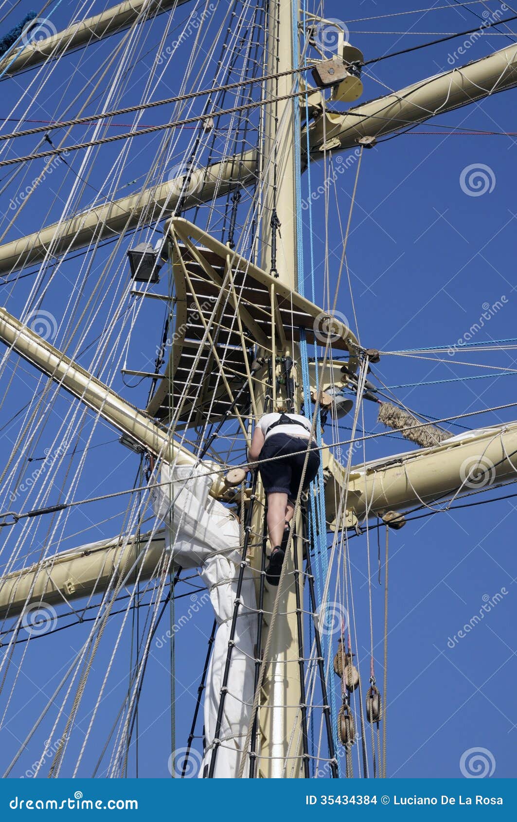Sailor Working in the Rigging of a Sailboat Stock Photo - Image of ...