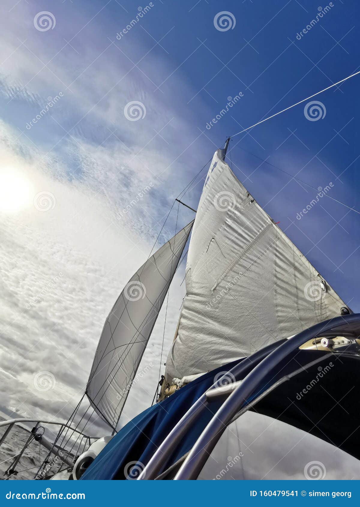 Sails Full of Wind with a Milky Sky Background Stock Image - Image of ...