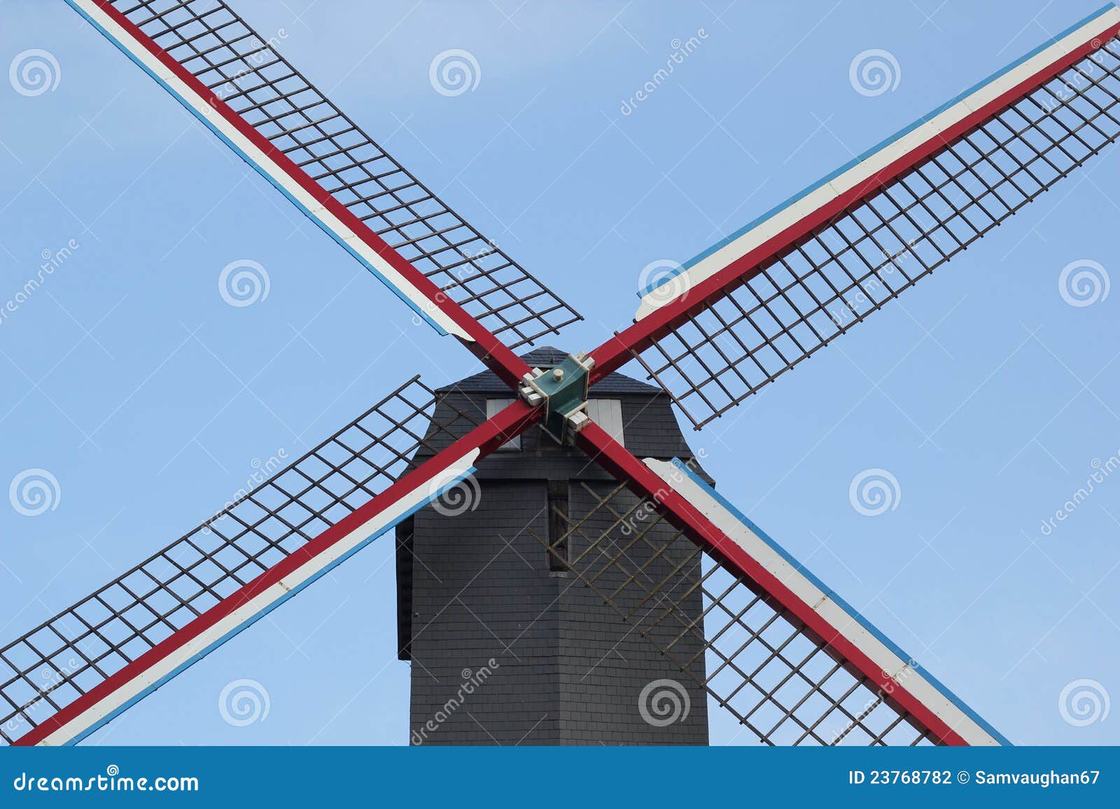The Sails of a Windmill Against a Clear Blue Sky Stock Photo - Image of ...