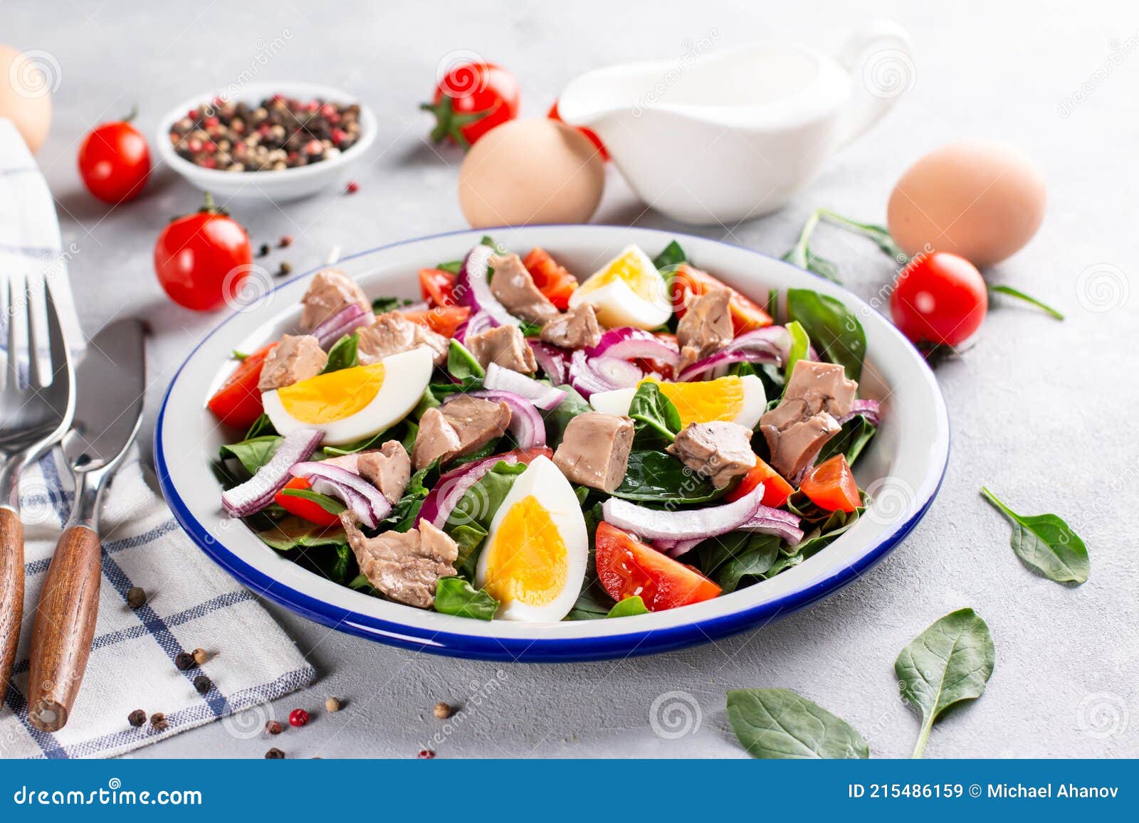 Salad from Cod Liver, Eggs and Vegetables on a Plate. Nutritious ...