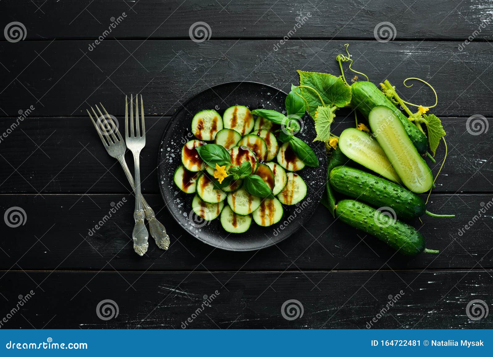 Salad of Fresh Cucumbers and Basil. Stock Image - Image of close ...
