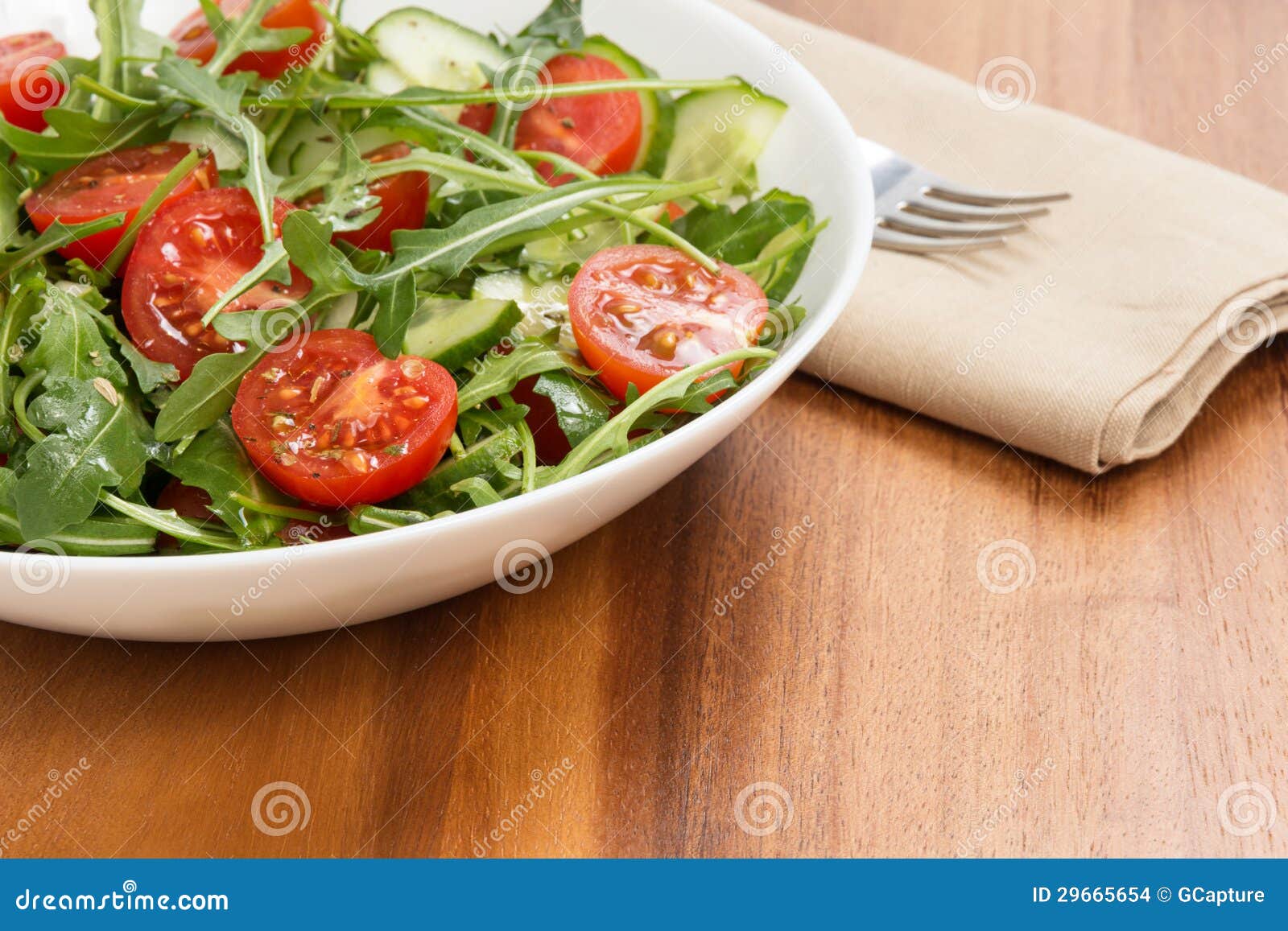 Salad from Ruccola, Cherry Tomatoes and Cucumber Stock Photo - Image of ...