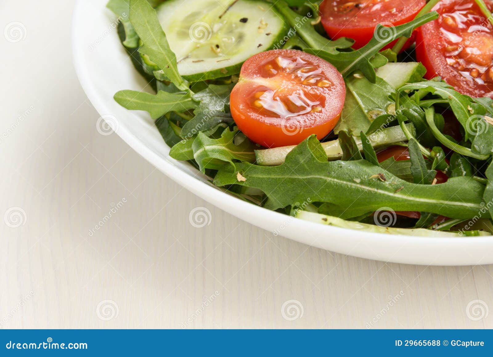 Salad from Ruccola, Cherry Tomatoes and Cucumber Stock Photo - Image of ...