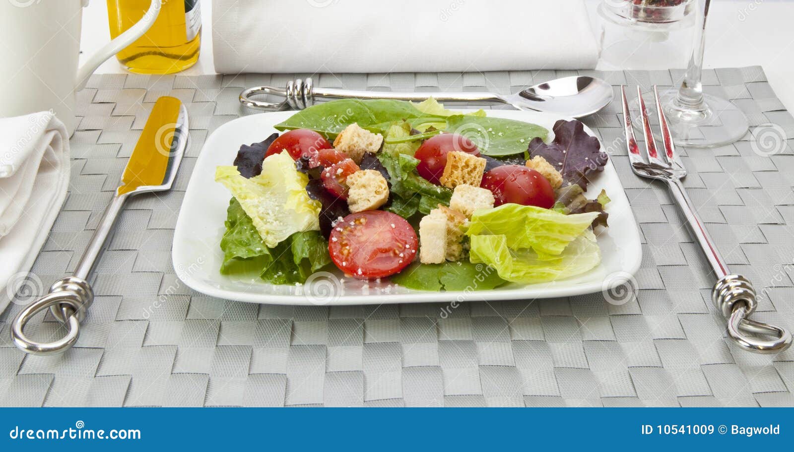Salad with table setting stock image. Image of bread - 10541009