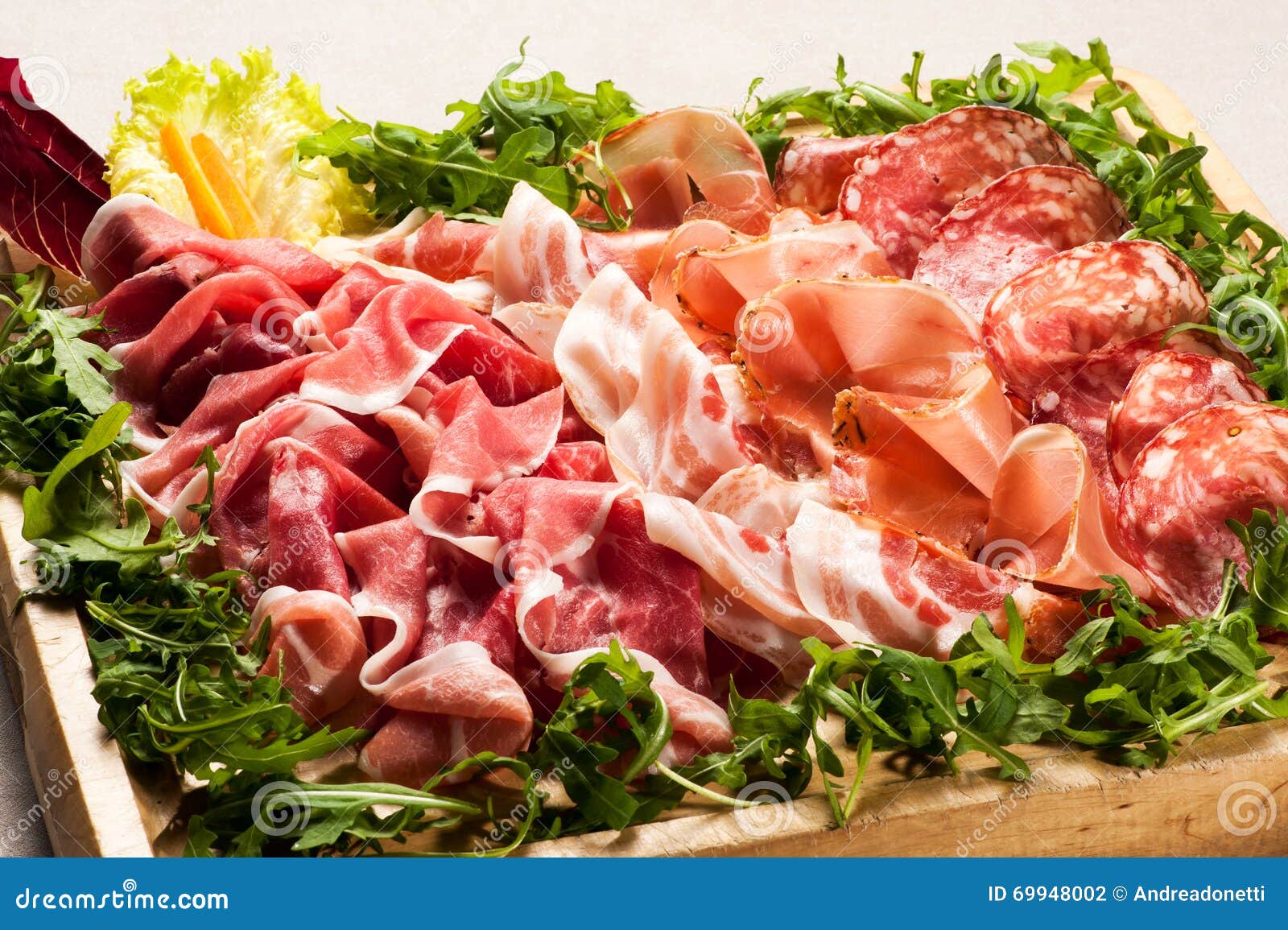 Salami Cold Cuts in Box Surrounded with Greens Stock Photo - Image of ...