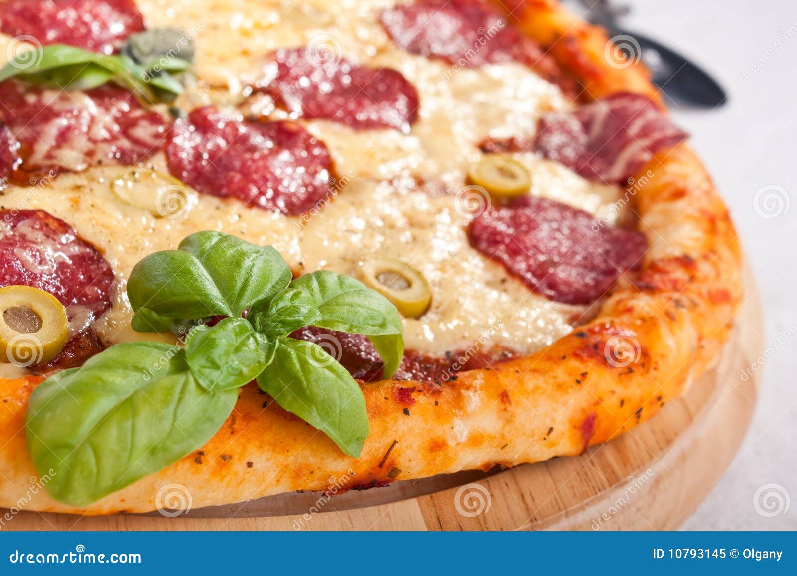 Salami pizza close-up stock image. Image of food, leaf - 10793145