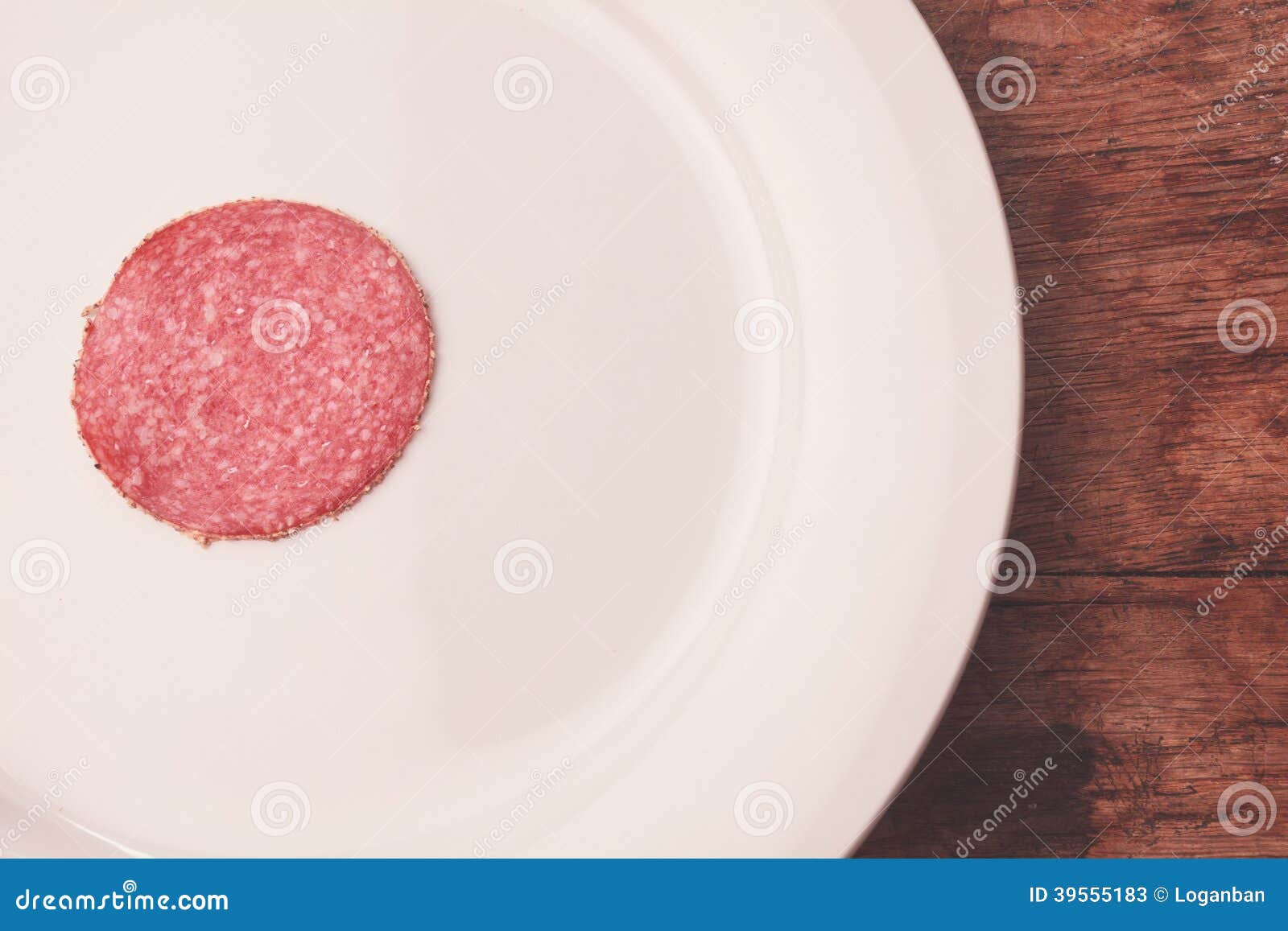 Salami on plate stock image. Image of wood, single, protein - 39555183
