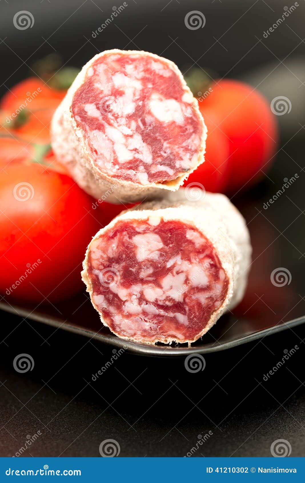 Salami on Plate with Tomatoes Close Up Stock Photo - Image of mold ...