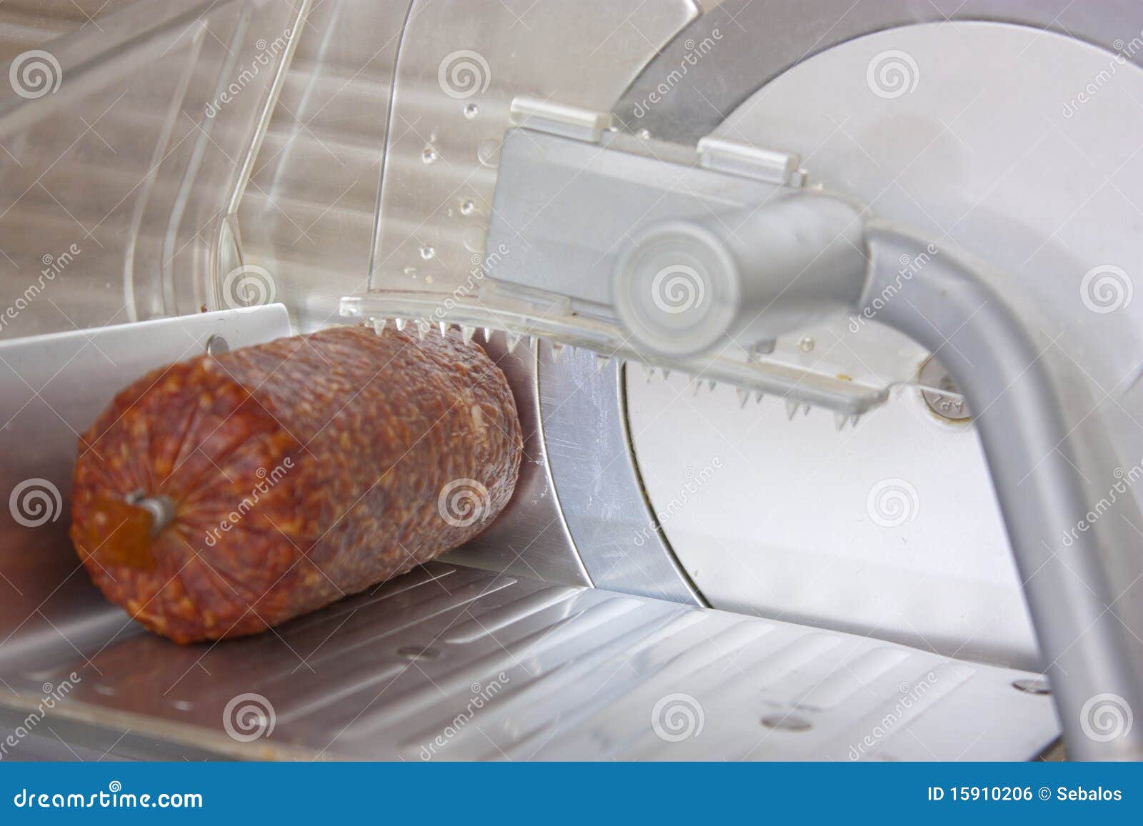 Salami on slicer stock photo. Image of piece, snack, meaty - 15910206